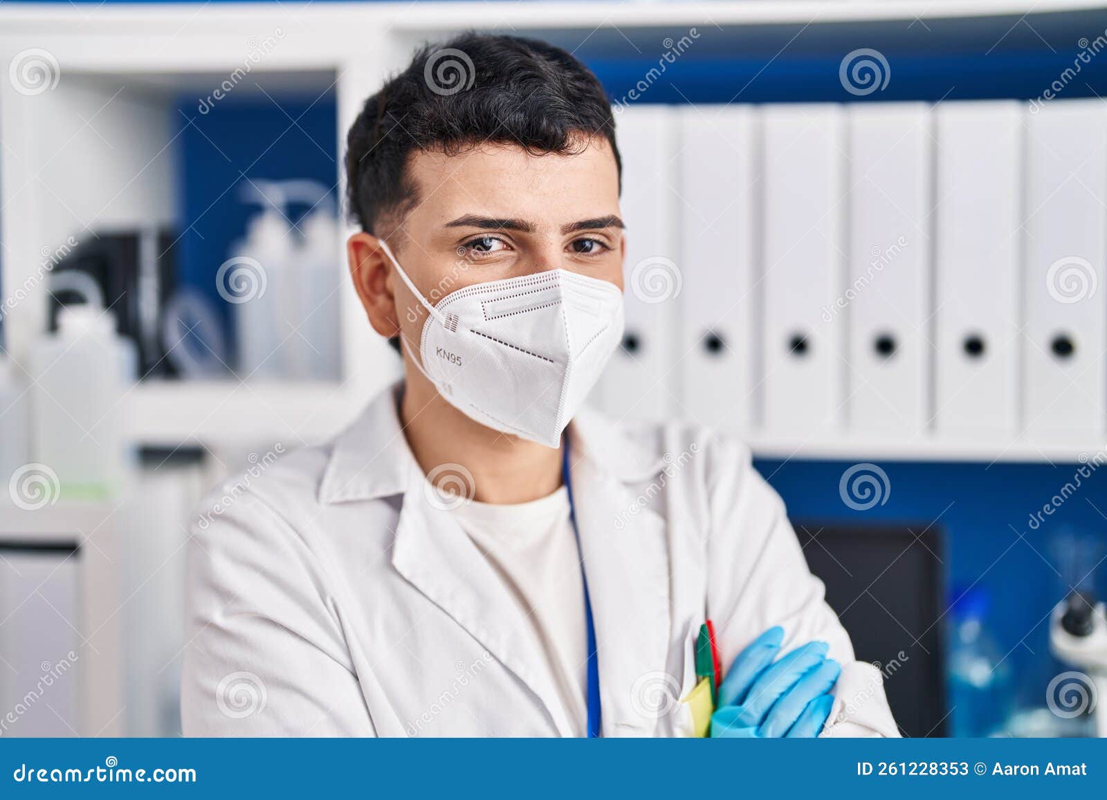 Young Non Binary Man Scientist Wearing Medical Mask at Laboratory Stock ...