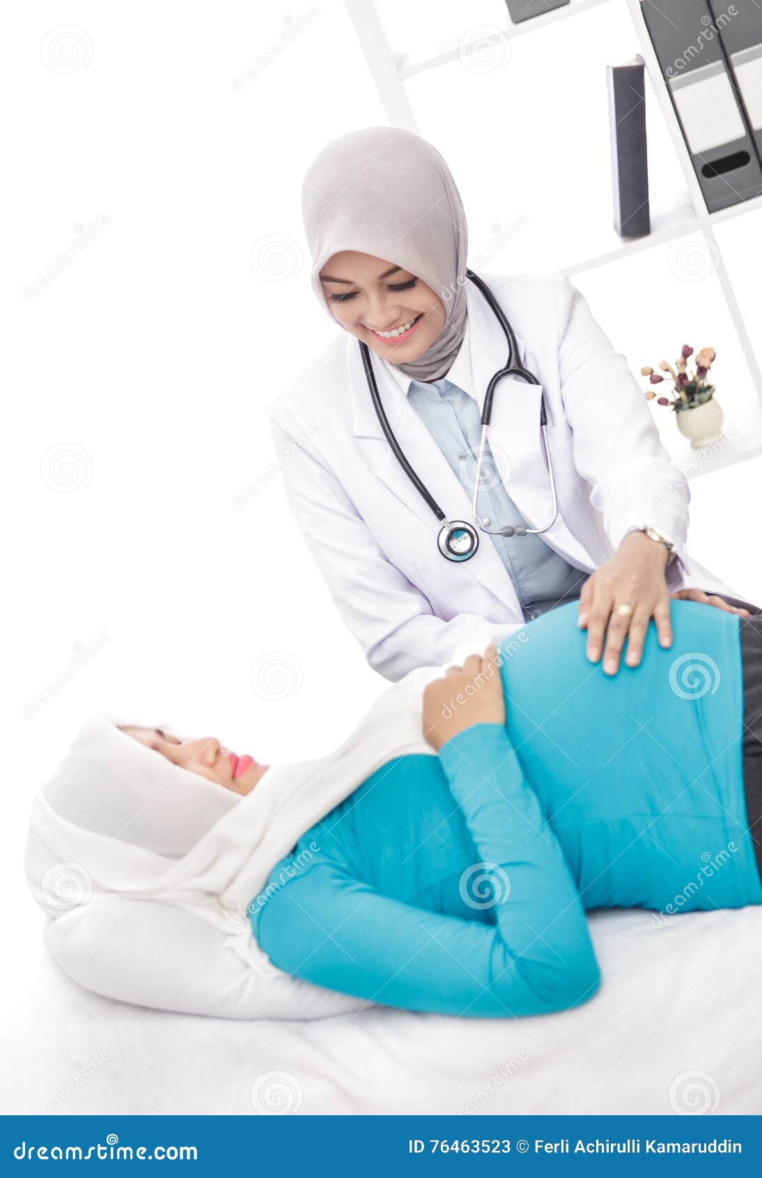 Young Obstetrician with Stethoscope with Her Patient Stock Image ...
