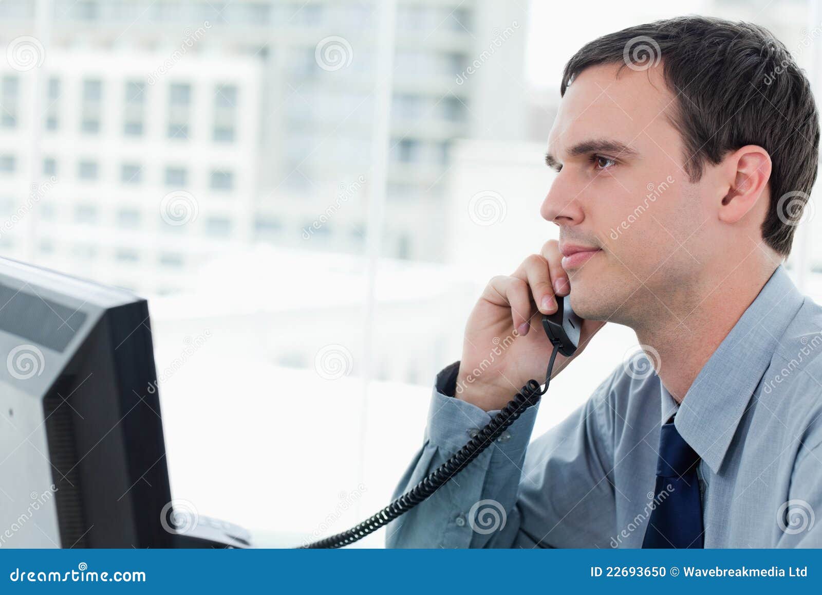 Young Office Worker on the Phone Stock Photo - Image of business, phone ...