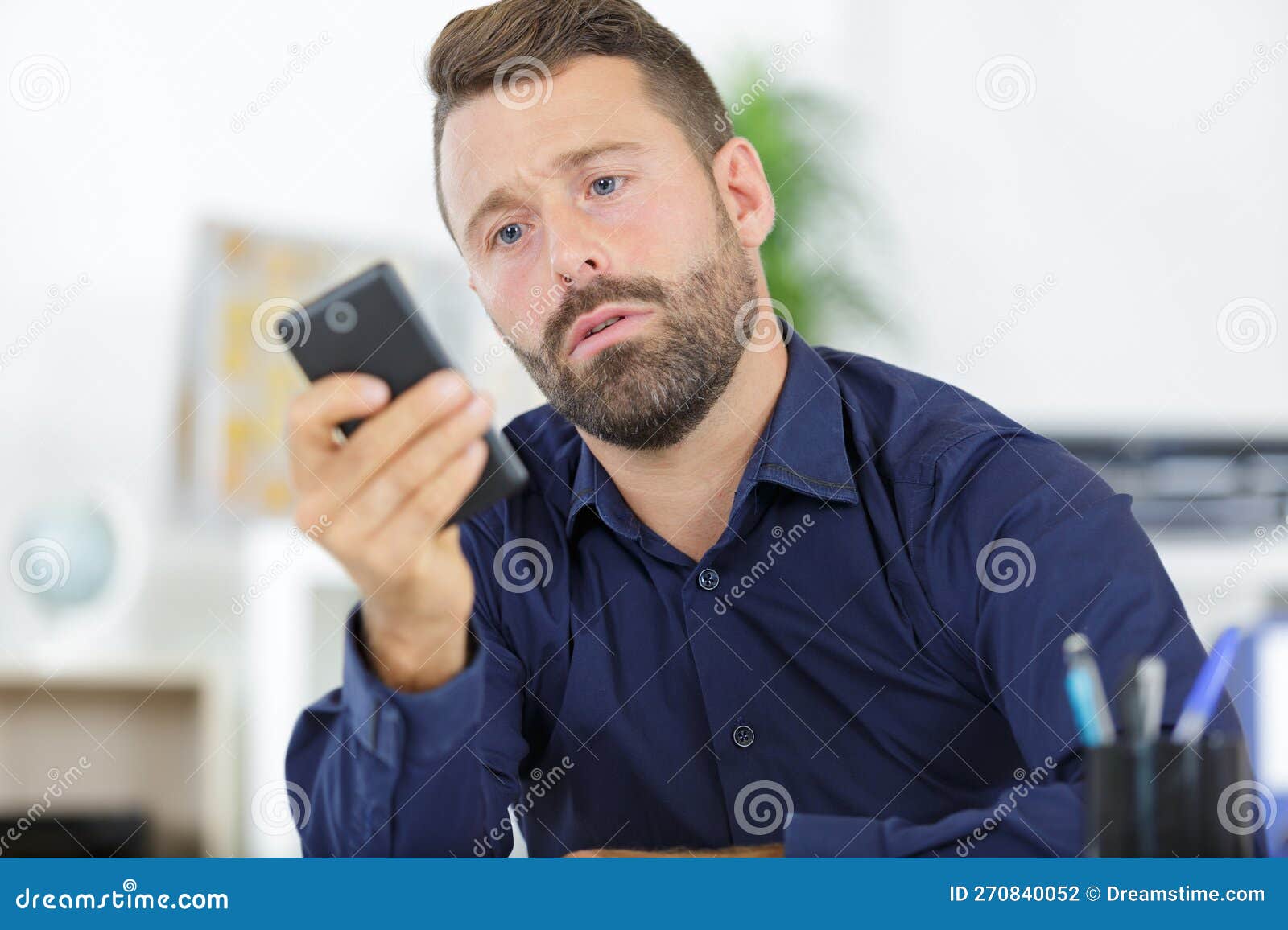 Young Office Worker Reading Text Message Stock Photo - Image of ...