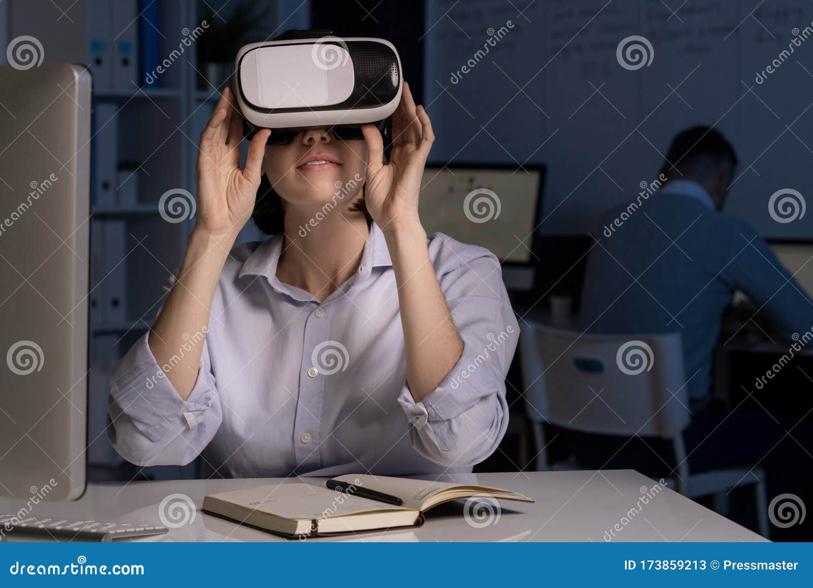 Young Office Worker with Vr Headset Sitting by Desk in Front of ...
