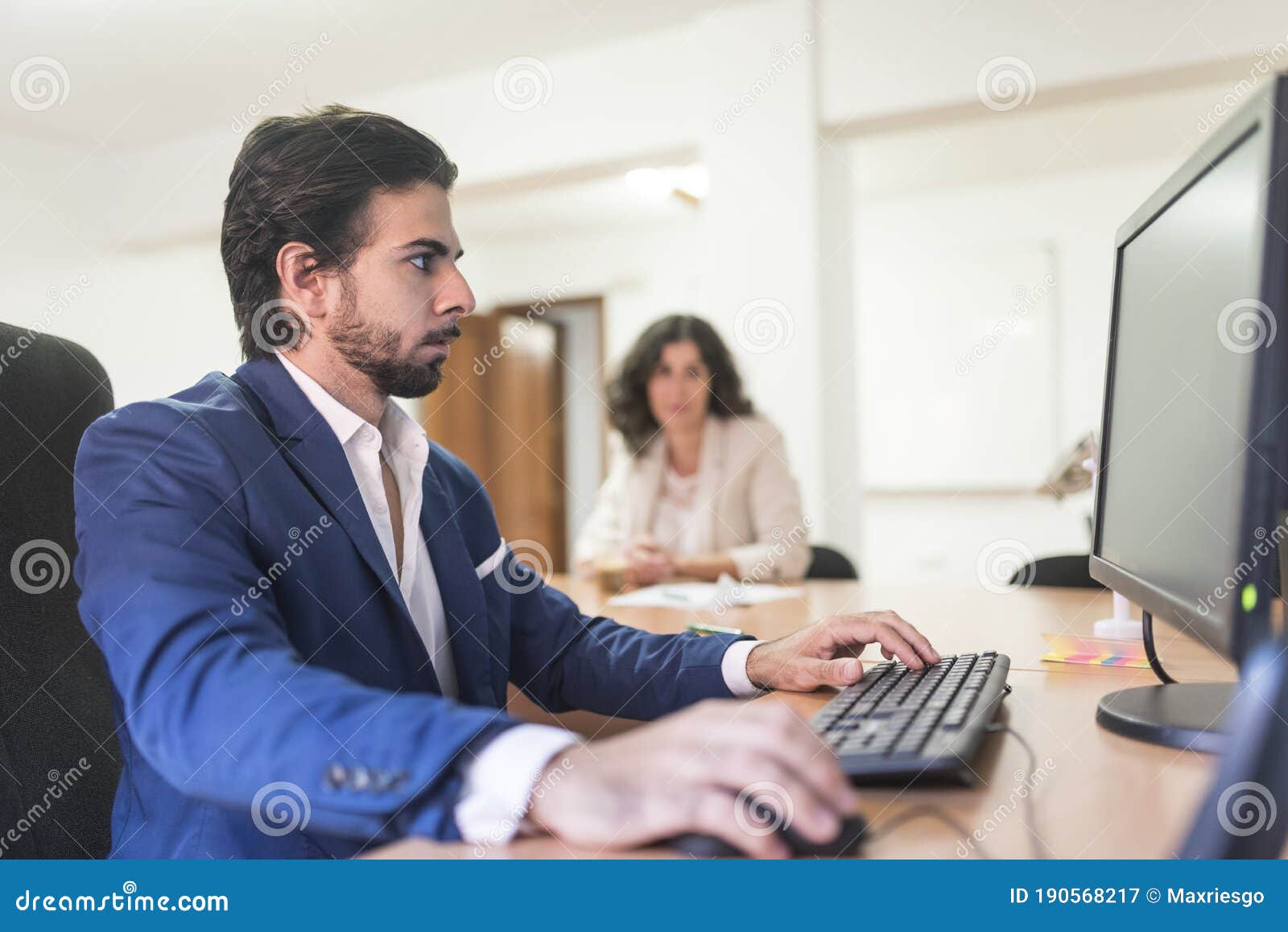Young Office Worker Working at Computer in Desk Stock Image - Image of ...