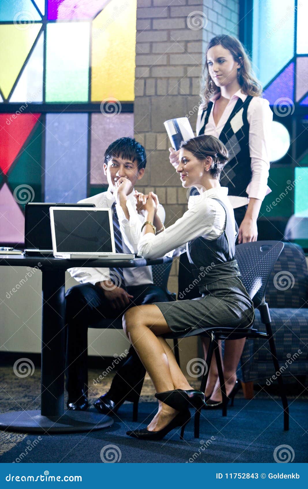 Young Office Workers in Colorful Meeting Room Stock Image - Image of ...