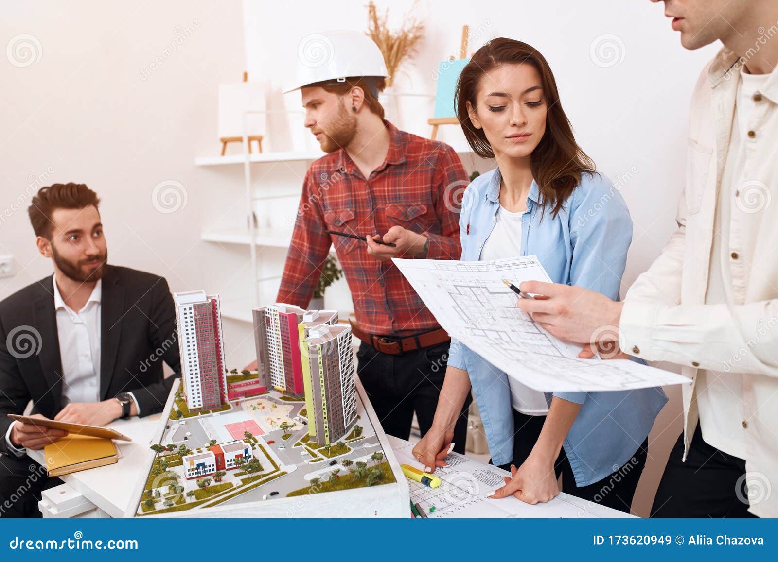 Young Office Workers Completing a Project, Submitting a Model To Their ...