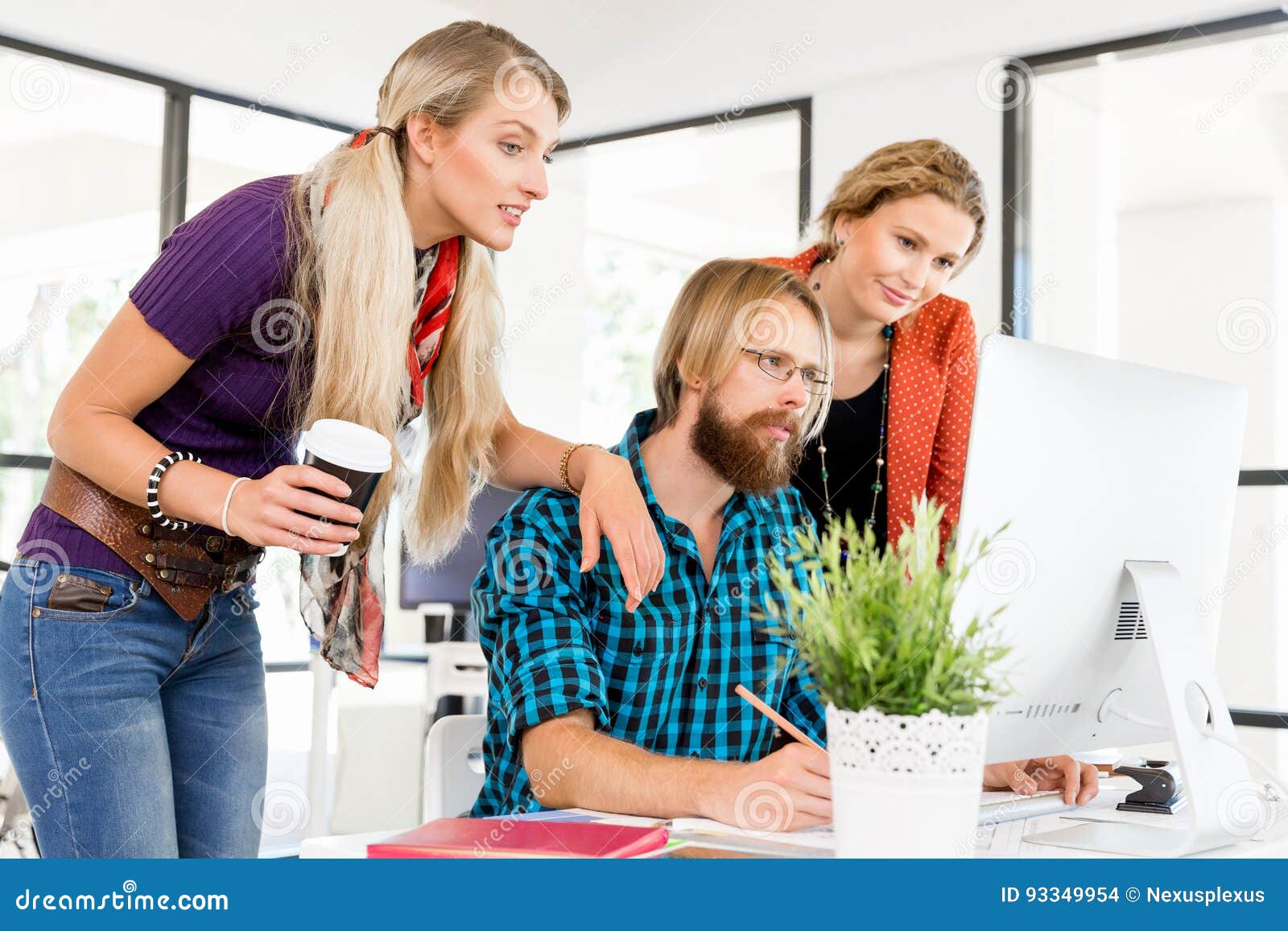 Young Office Workers Discussing Stock Photo - Image of designer ...