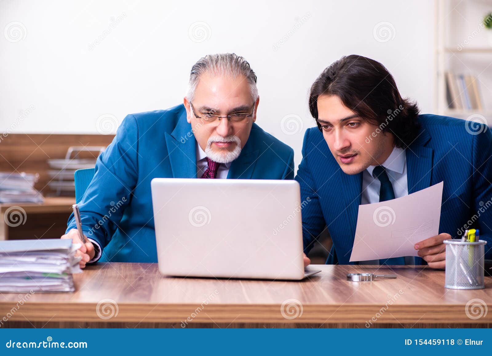 Young and Old Employees Working Together in the Office Stock Photo ...
