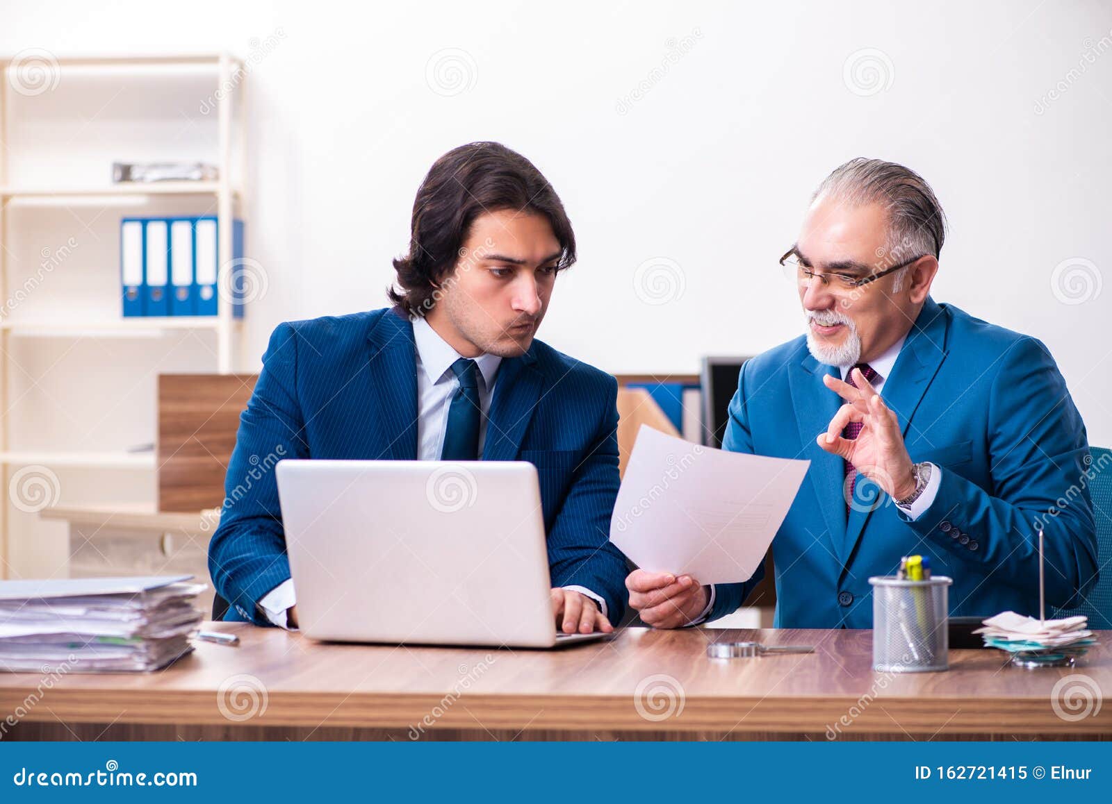 Young and Old Employees Working Together in the Office Stock Image ...
