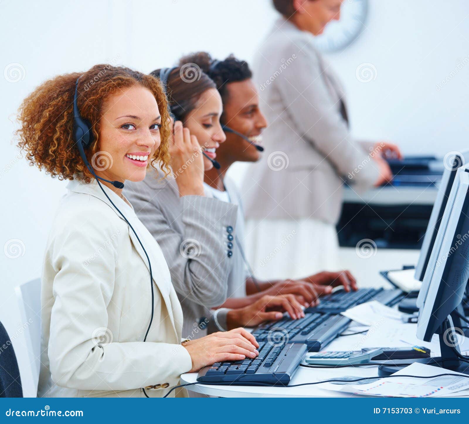 Young Operators Busy at Work Sitting with Headsets Stock Image - Image ...