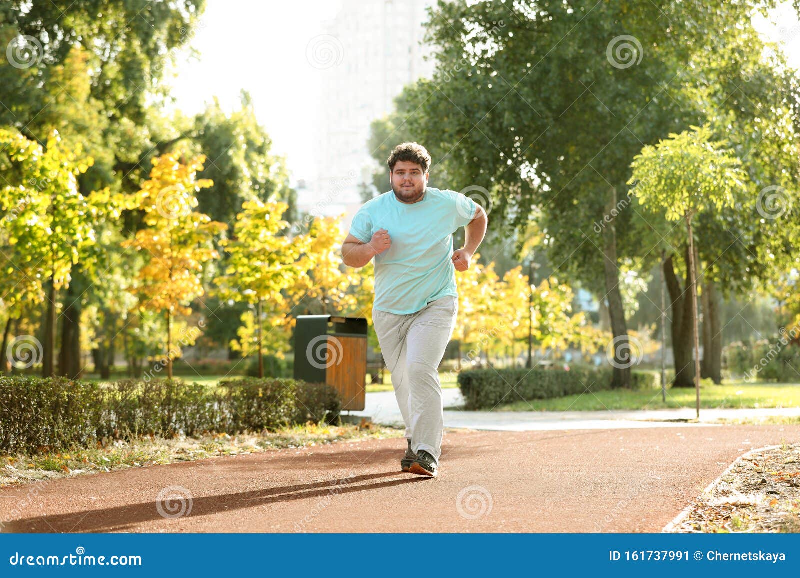 Young Overweight Man Running in Park Stock Image - Image of fitness ...