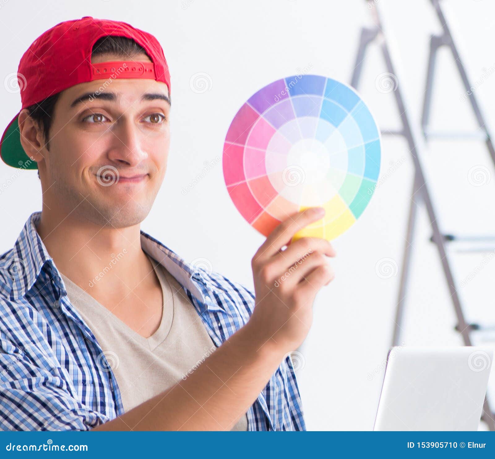 Young Painter Contractor Choosing Colors for Home Renovation Stock ...