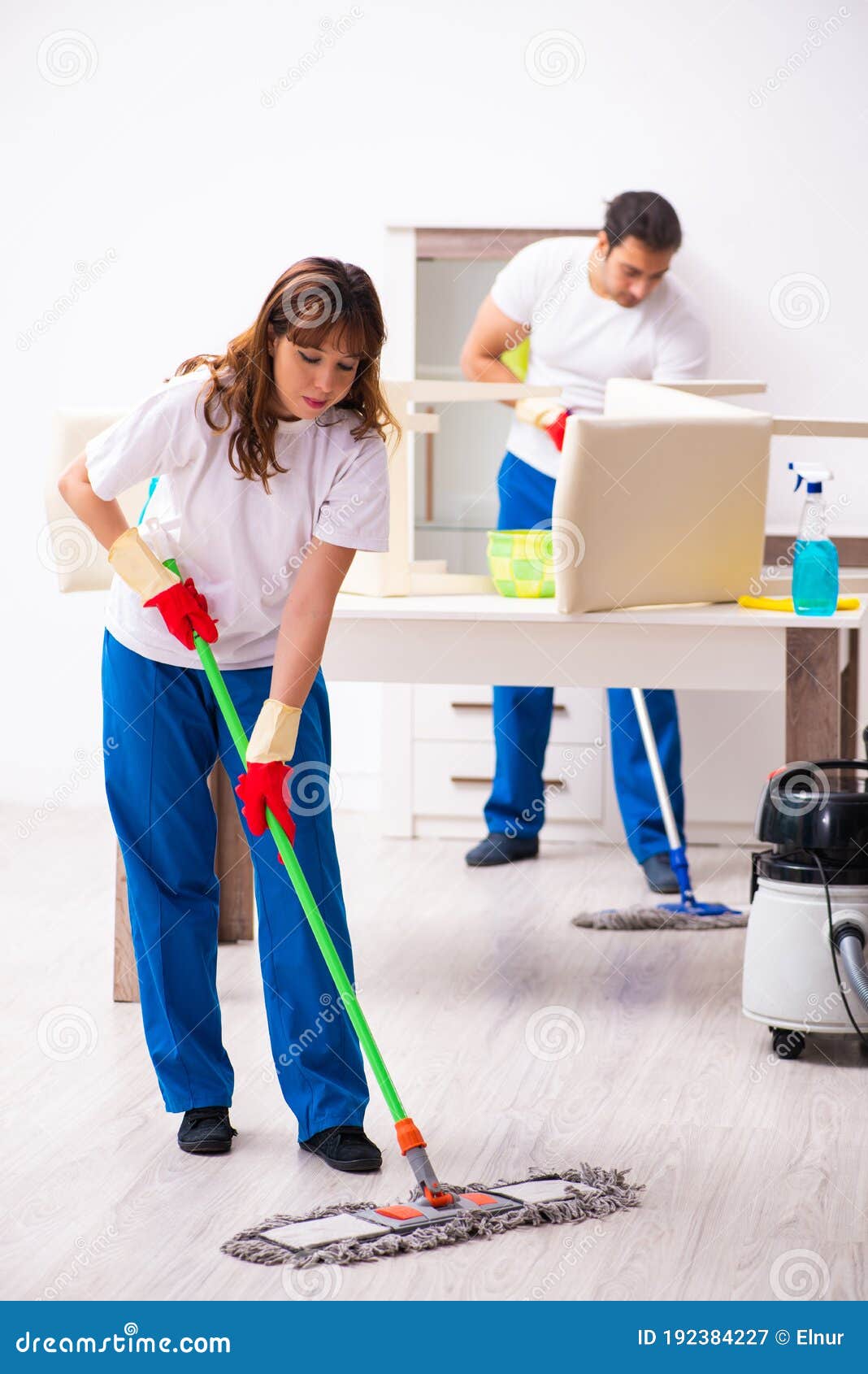 Young Pair Doing Housework at Home Stock Image - Image of dusty ...