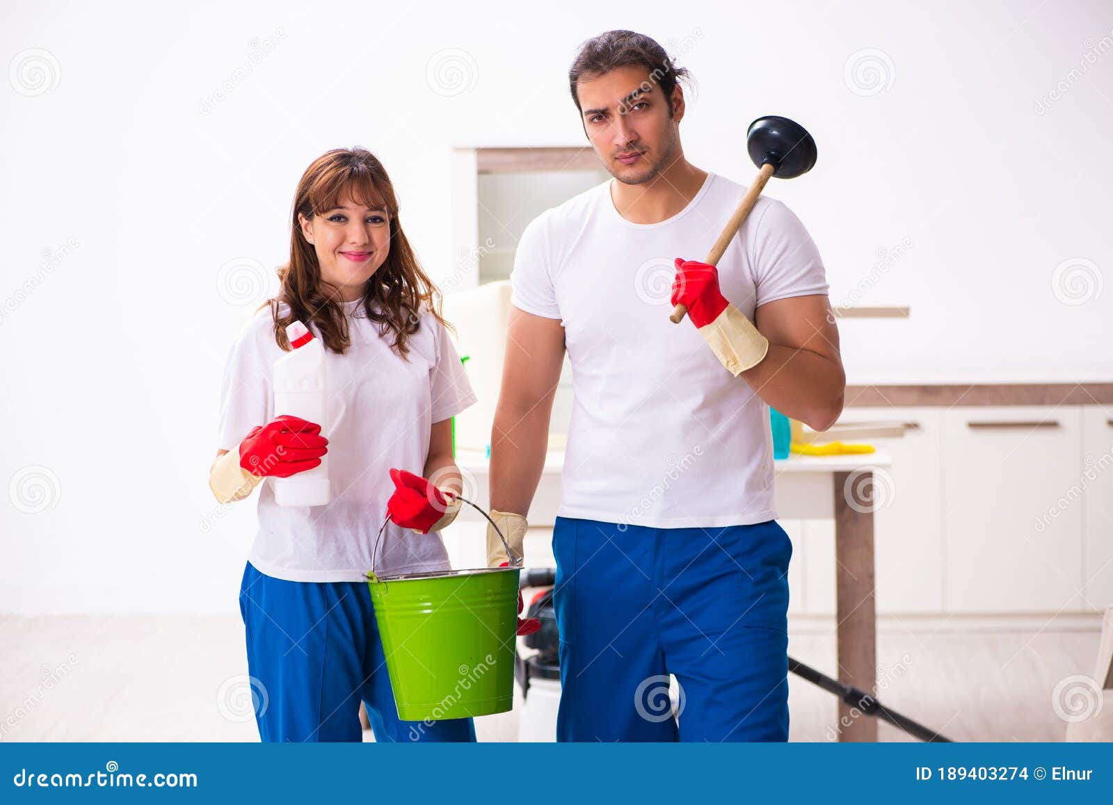 Young Pair Doing Housework at Home Stock Photo - Image of leak ...