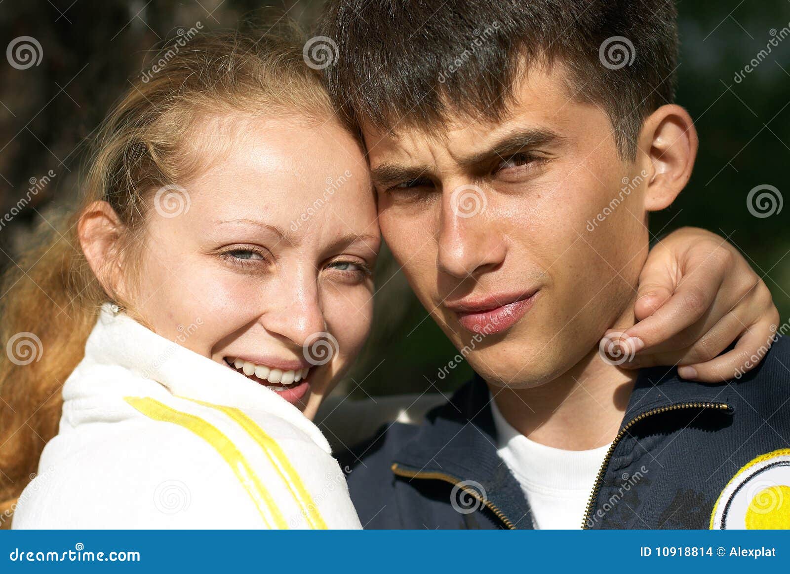 Young Pair of Lovers Embrace Stock Photo - Image of smiles, gloomy ...