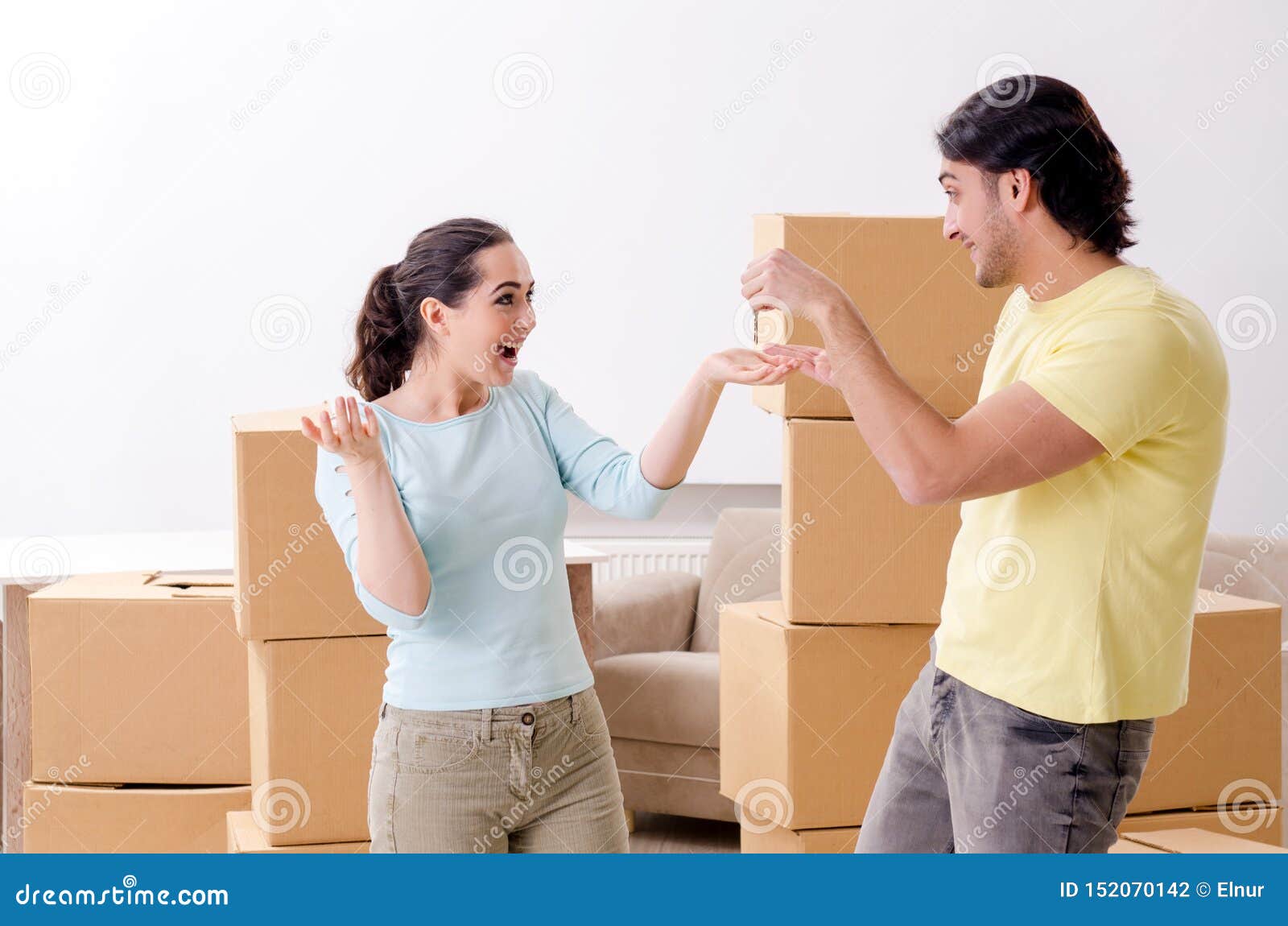 Young Pair Moving To New Apaprtment Stock Photo - Image of celebration ...