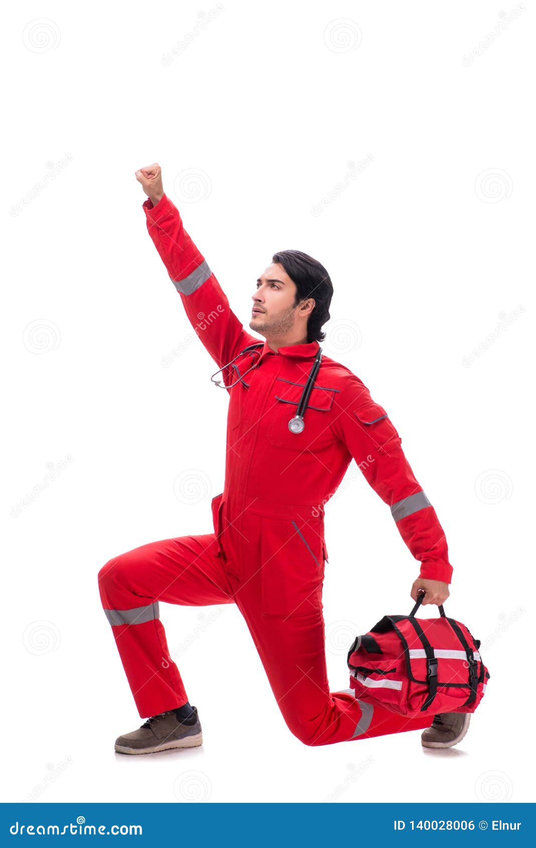 The Young Paramedic in Red Uniform Isolated on White Stock Photo ...