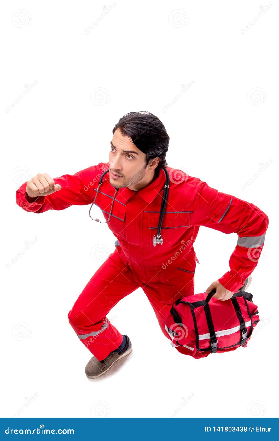 The Young Paramedic in Red Uniform Isolated on White Stock Photo ...