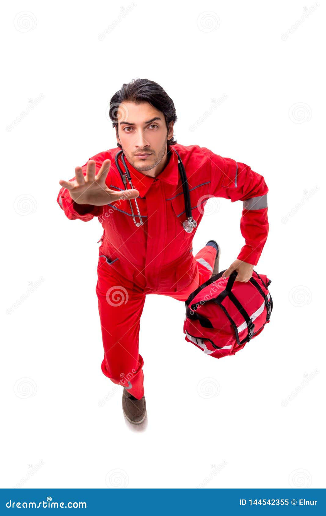 The Young Paramedic in Red Uniform Isolated on White Stock Image ...