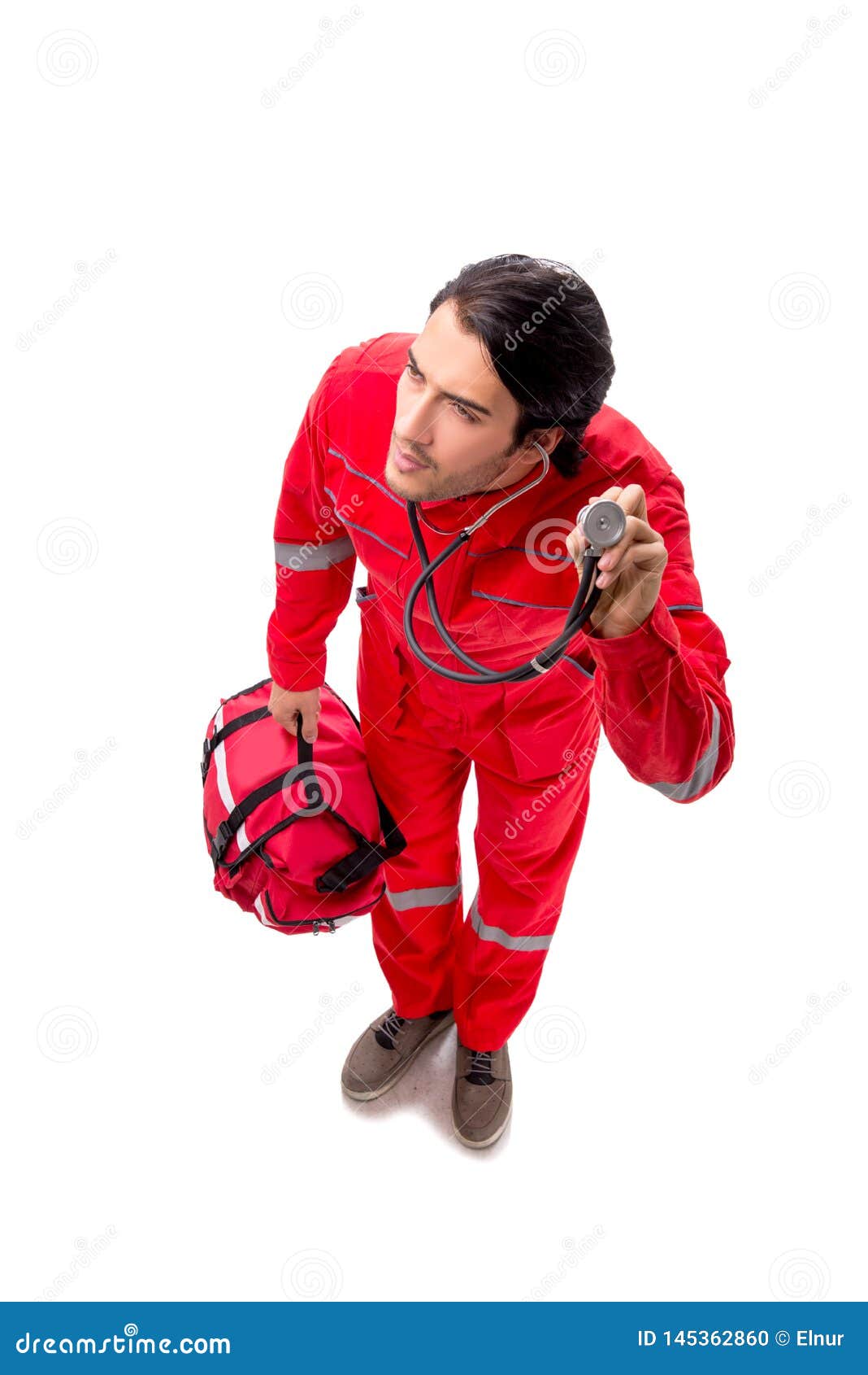 The Young Paramedic in Red Uniform Isolated on White Stock Photo ...