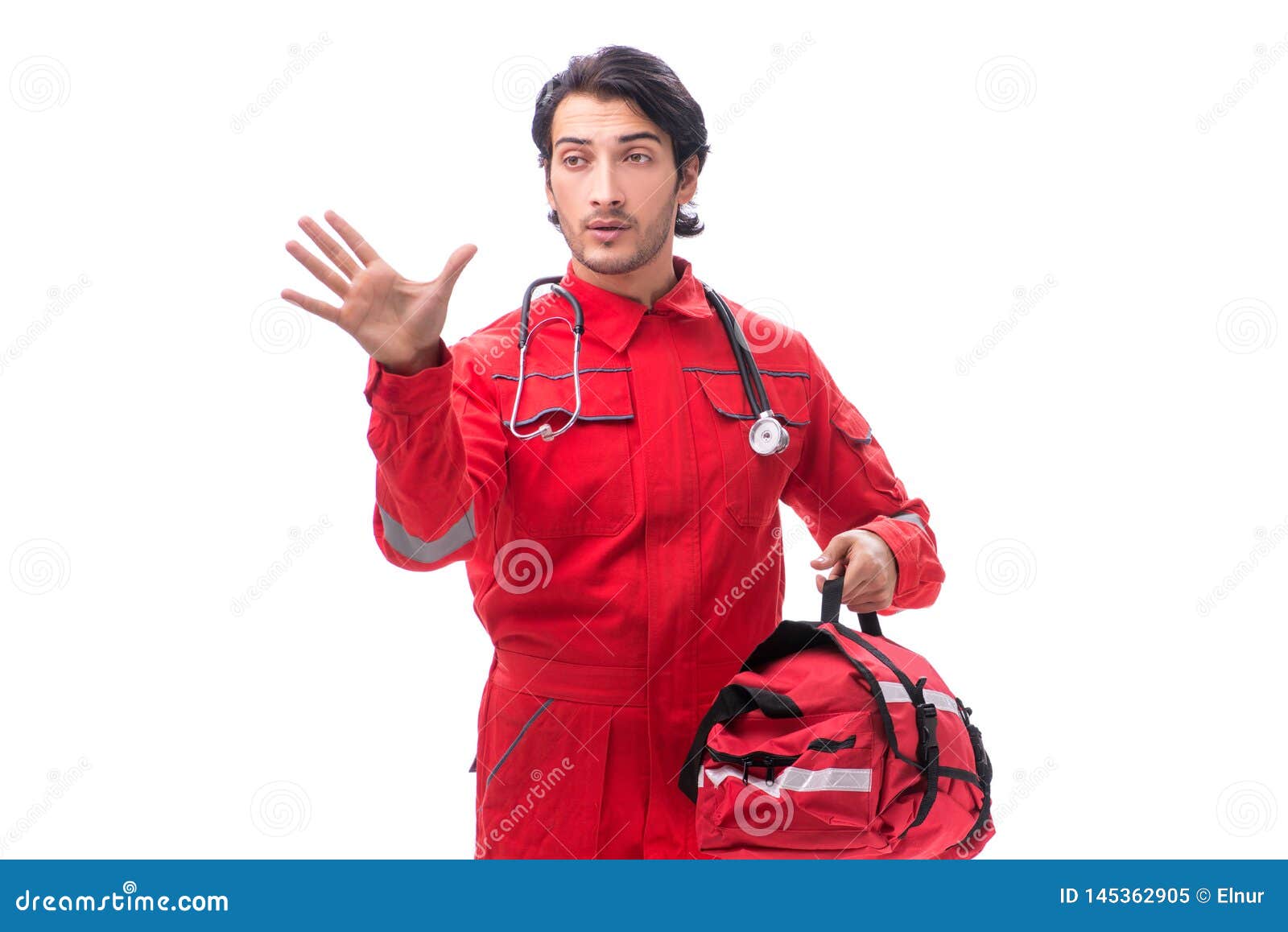 The Young Paramedic in Red Uniform Isolated on White Stock Image ...