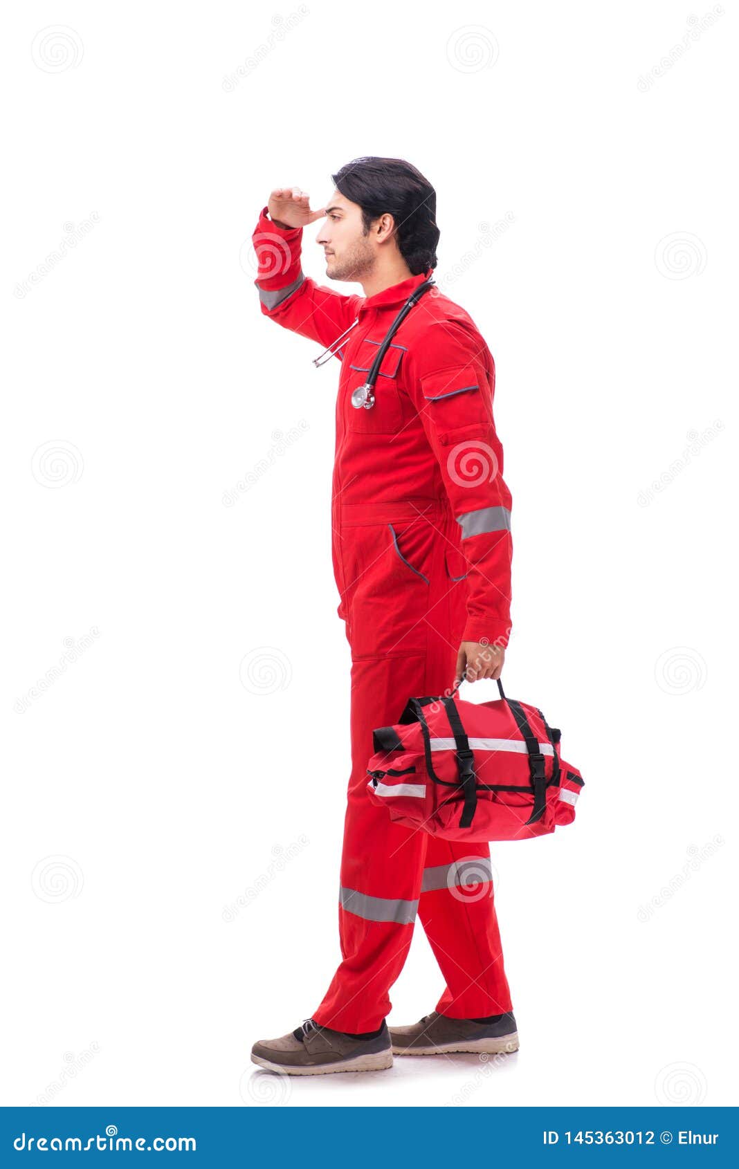 The Young Paramedic in Red Uniform Isolated on White Stock Photo ...