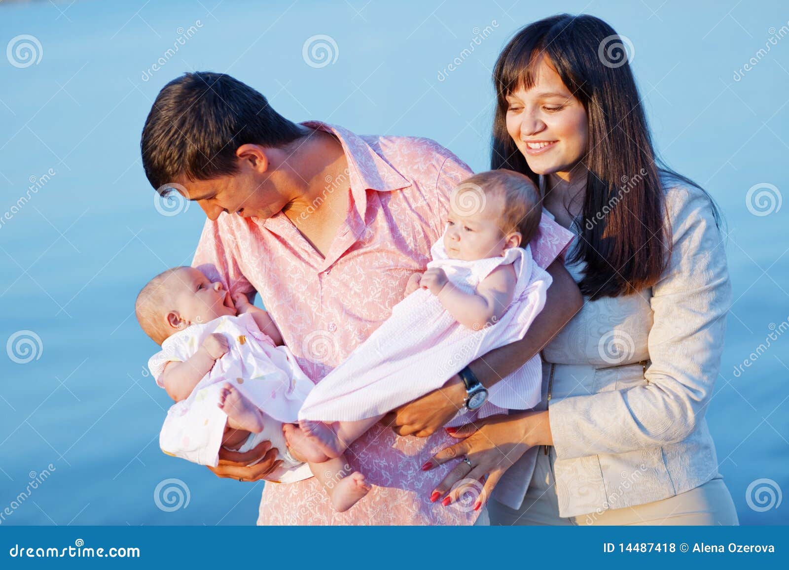 Young parents stock photo. Image of father, holding, gentle - 14487418
