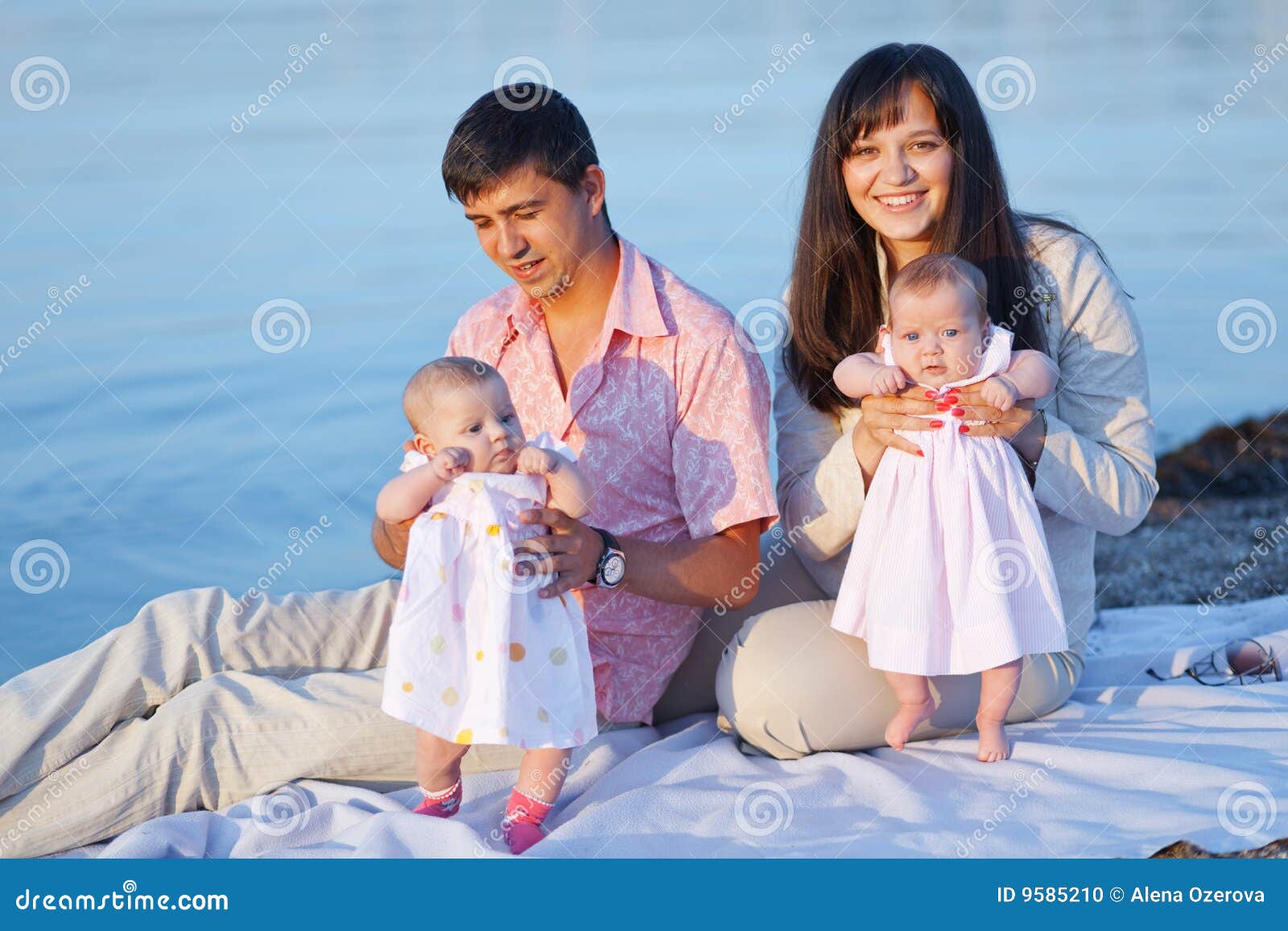 Young parents stock photo. Image of childhood, holding - 9585210