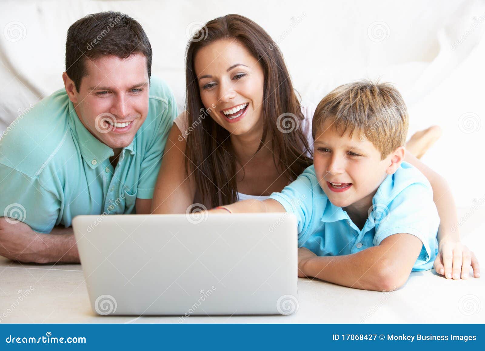 Young Parents, with Child, on Laptop Computer Stock Image - Image of ...