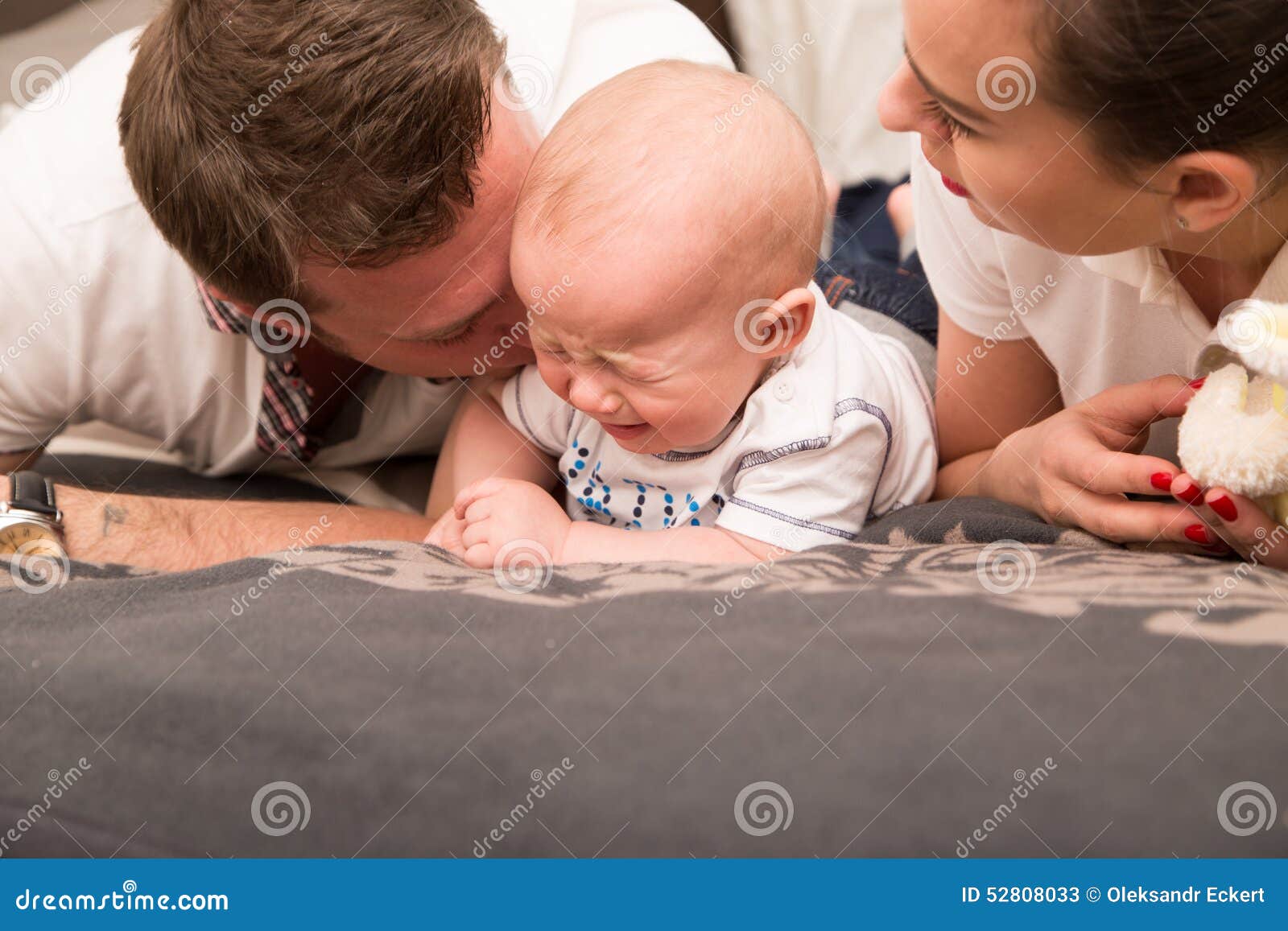 Young Parents Comfort Her Crying Baby Stock Image - Image of life, play ...
