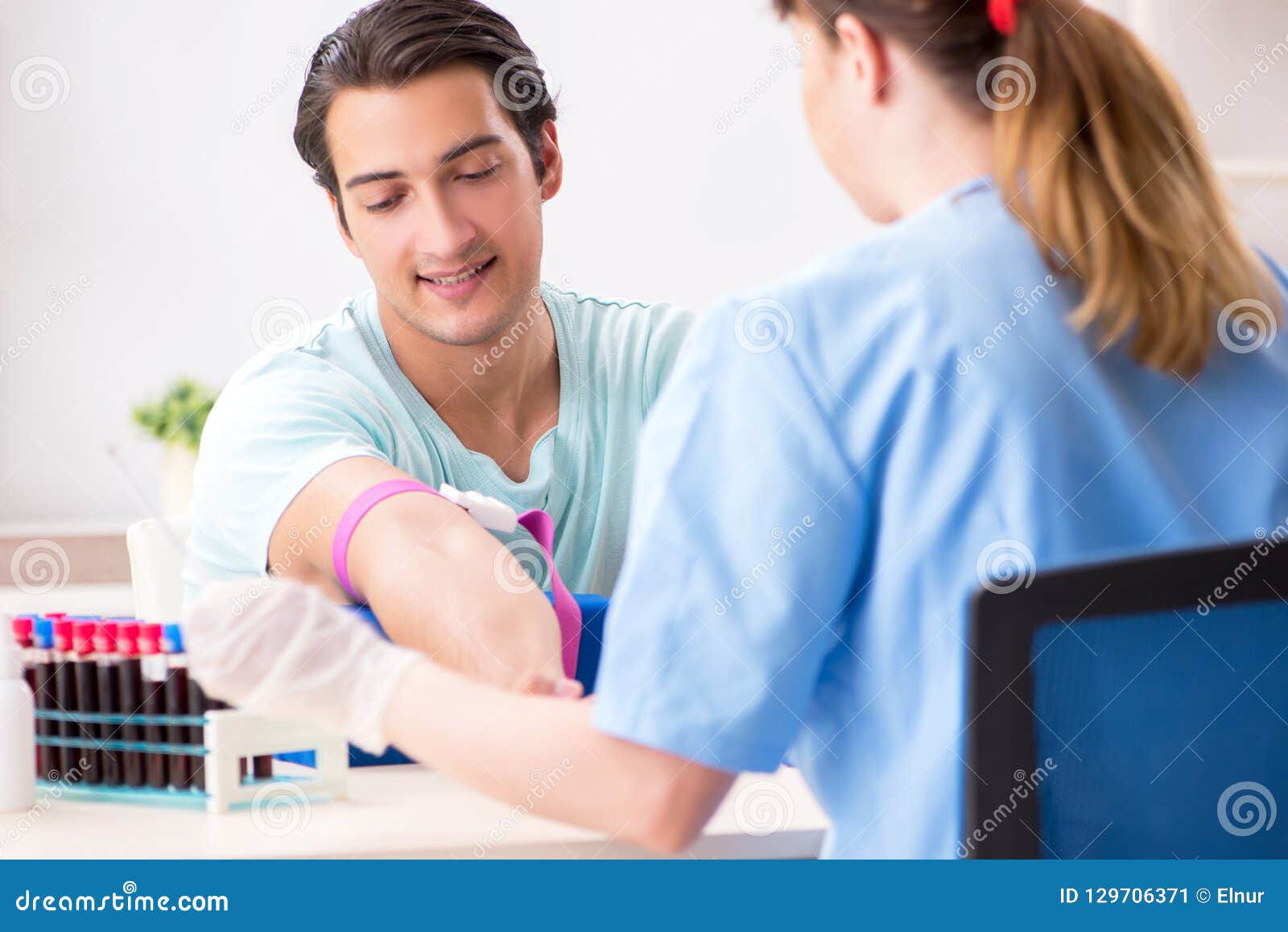 The Young Patient during Blood Test Sampling Procedure Stock Image ...