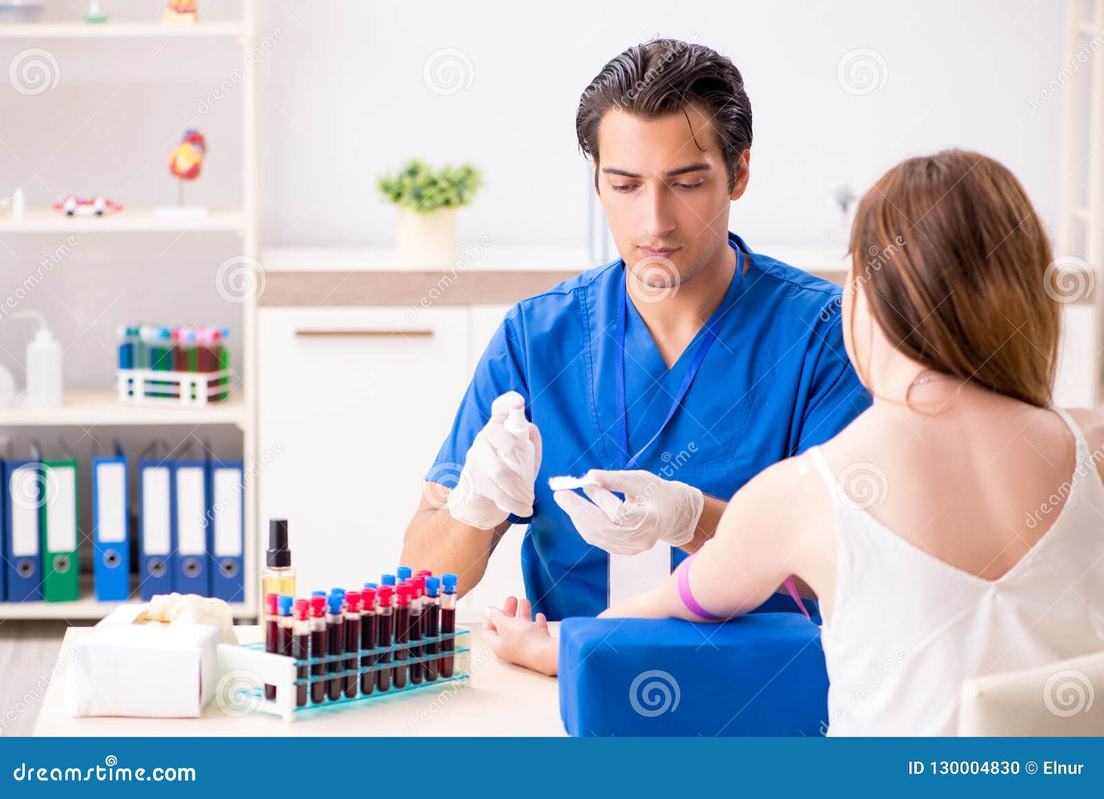 The Young Patient during Blood Test Sampling Procedure Stock Photo ...