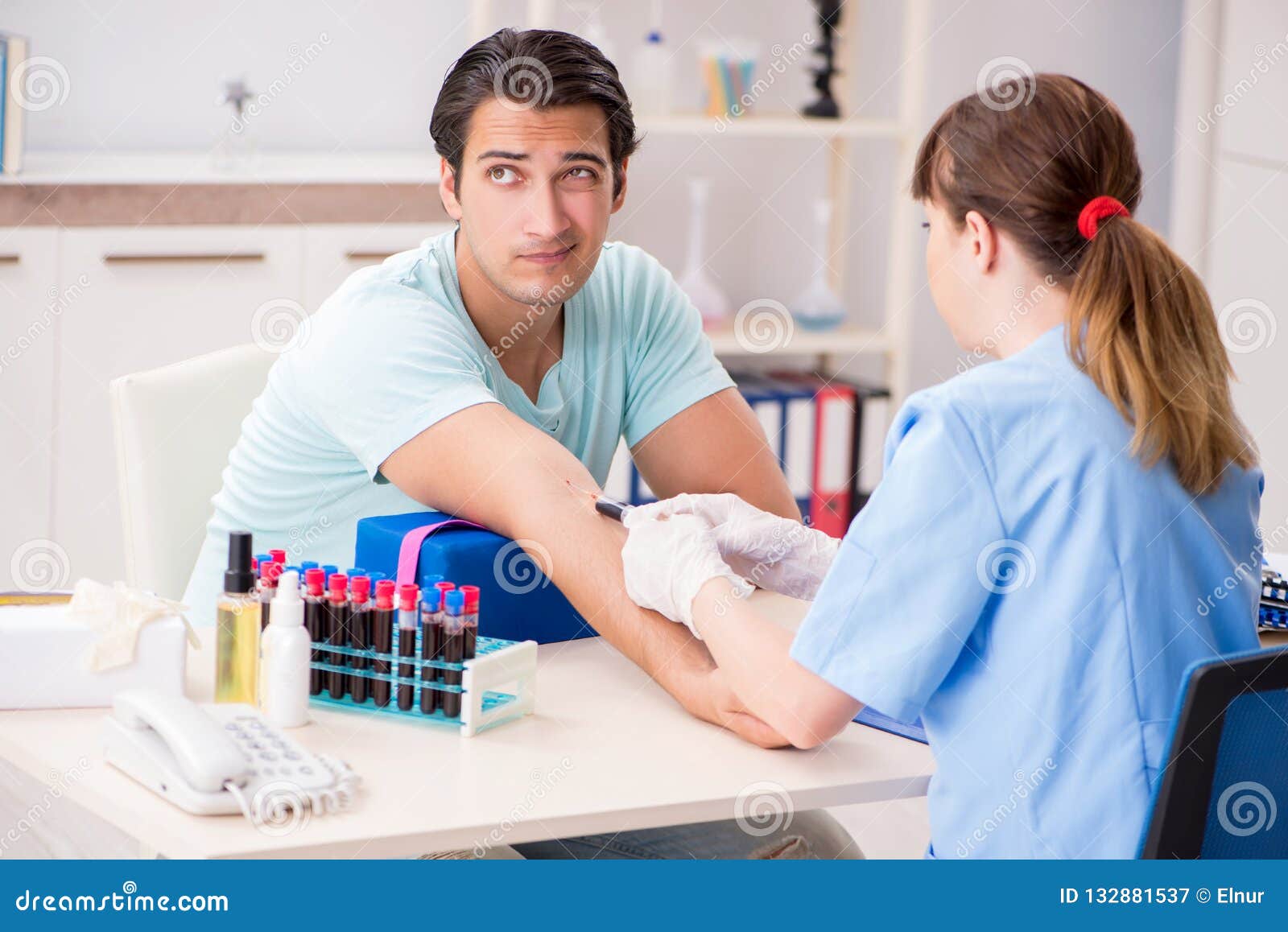 The Young Patient during Blood Test Sampling Procedure Stock Image ...