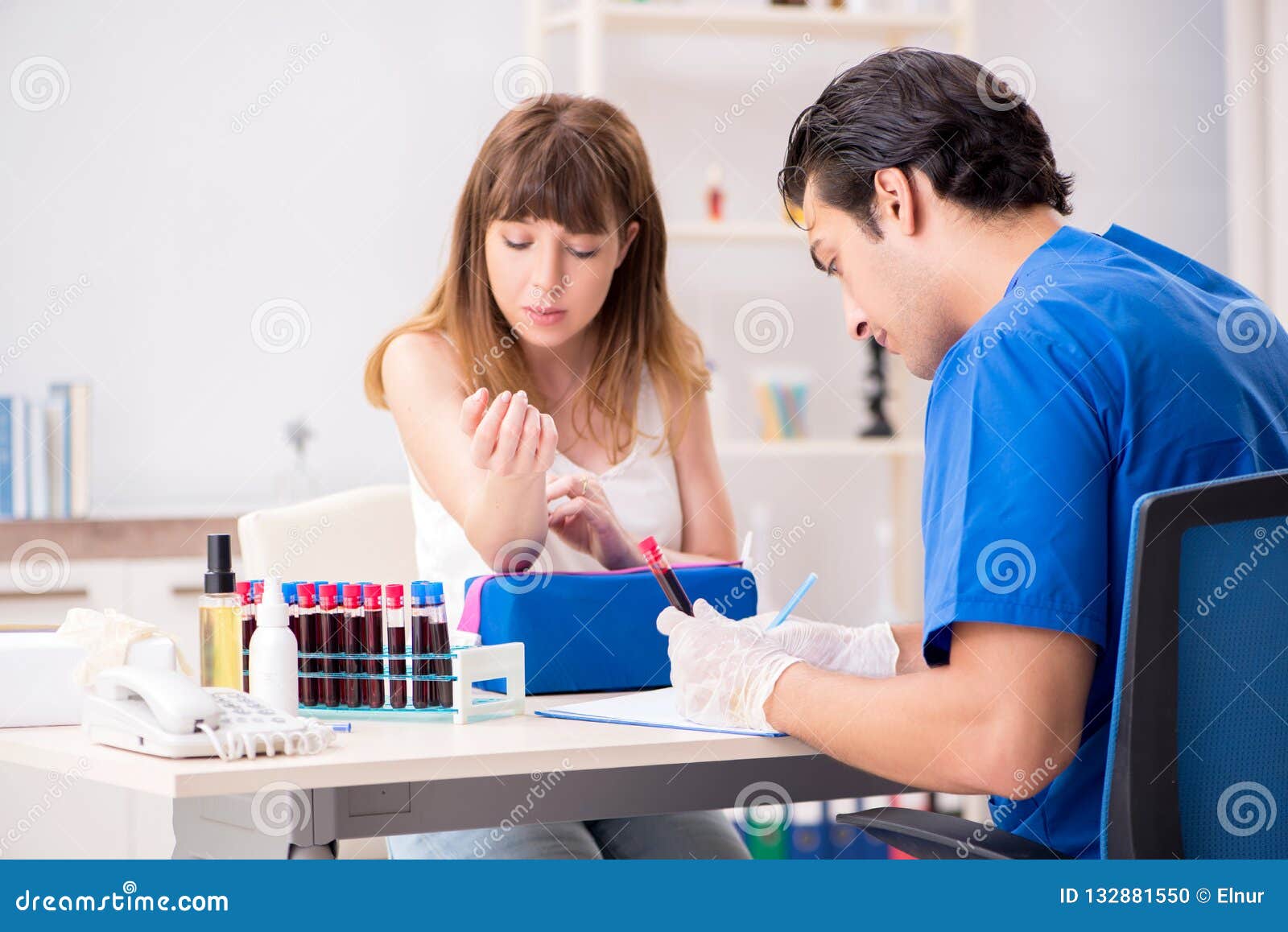 The Young Patient during Blood Test Sampling Procedure Stock Photo ...