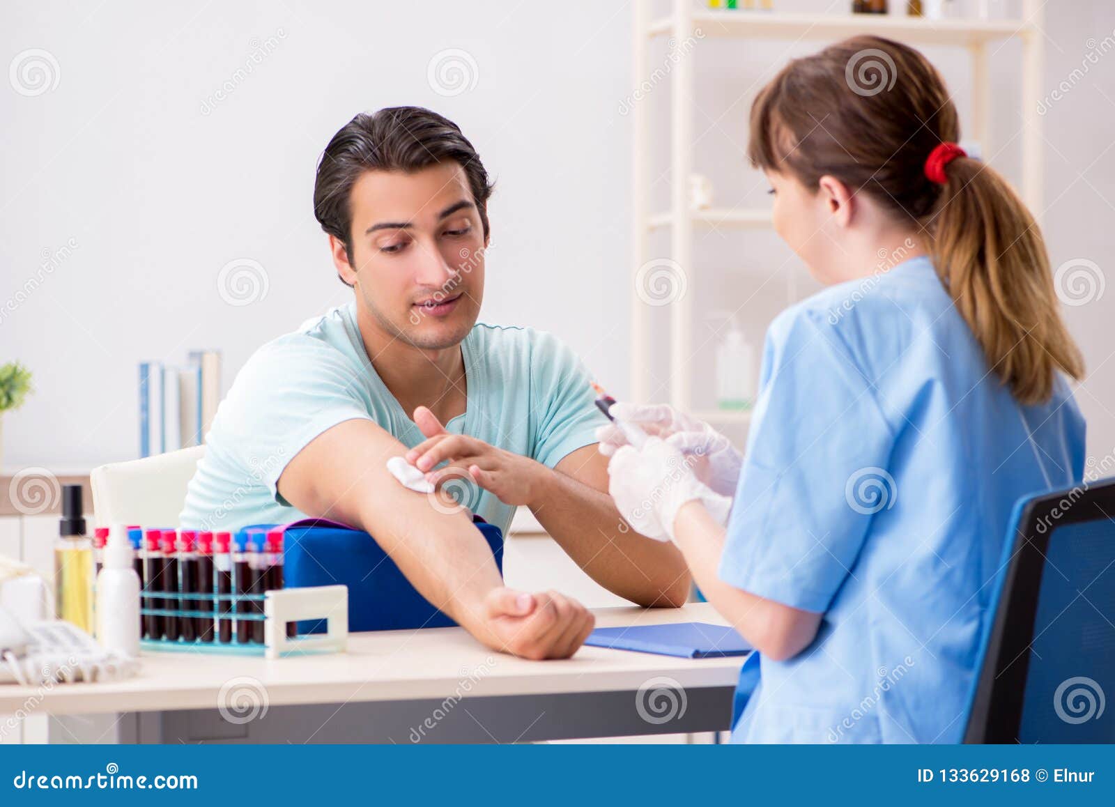 The Young Patient during Blood Test Sampling Procedure Stock Photo ...