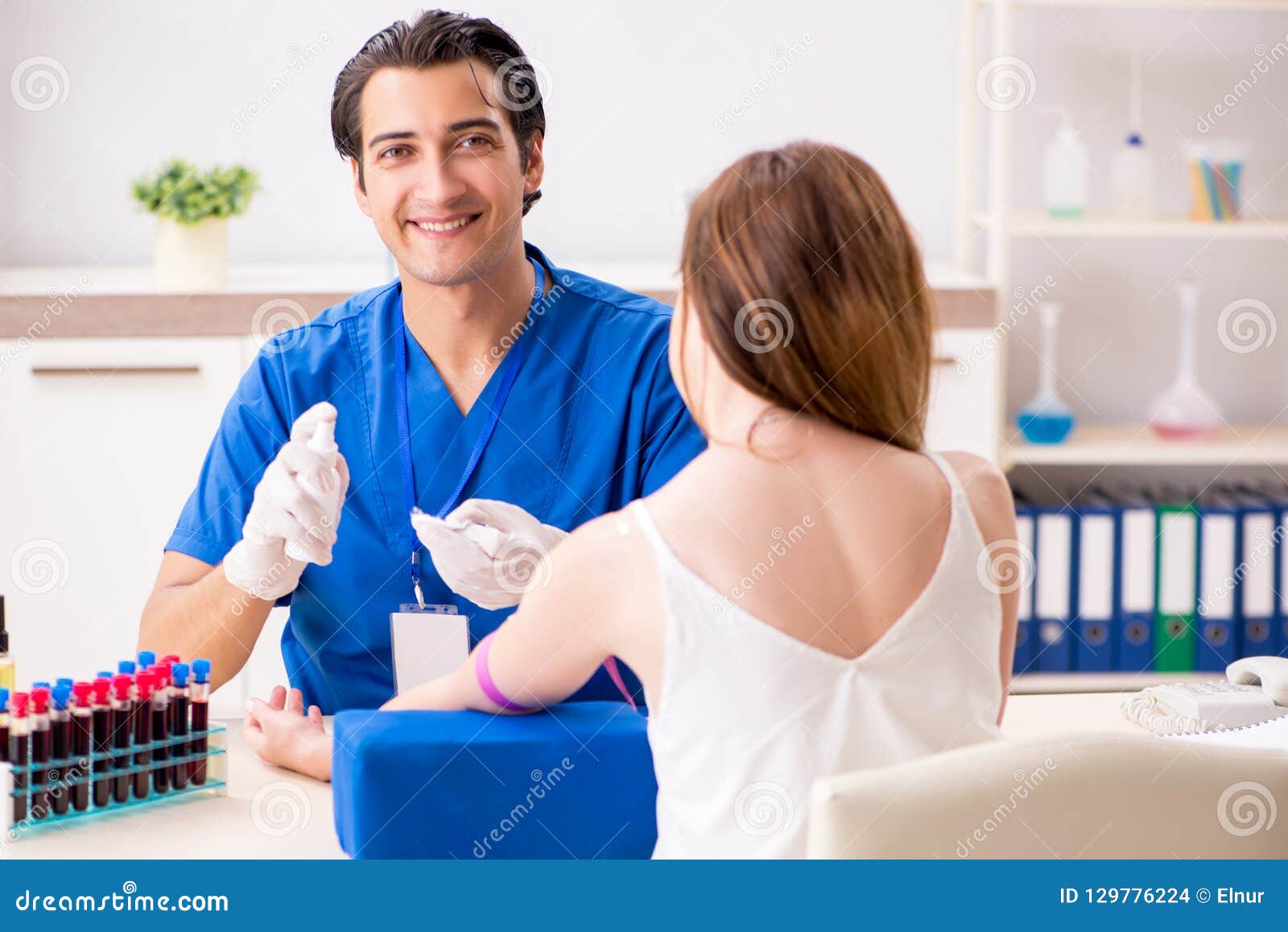 The Young Patient during Blood Test Sampling Procedure Stock Photo ...
