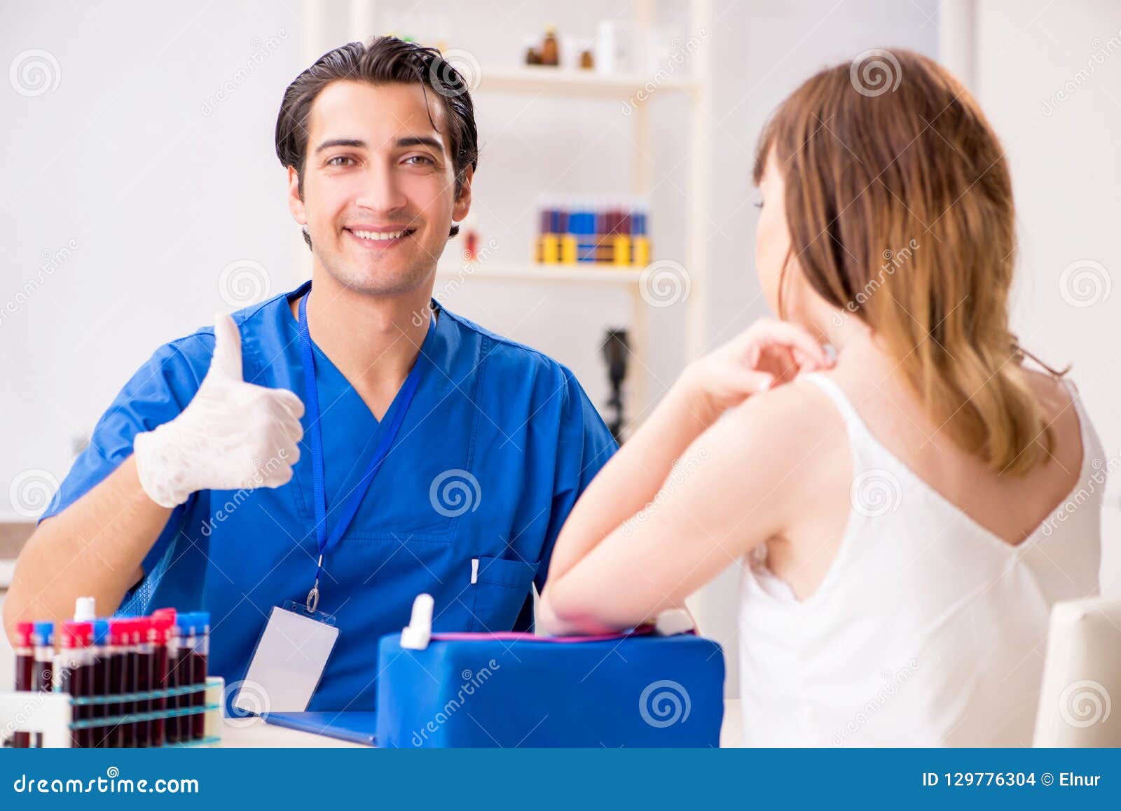 The Young Patient during Blood Test Sampling Procedure Stock Photo ...