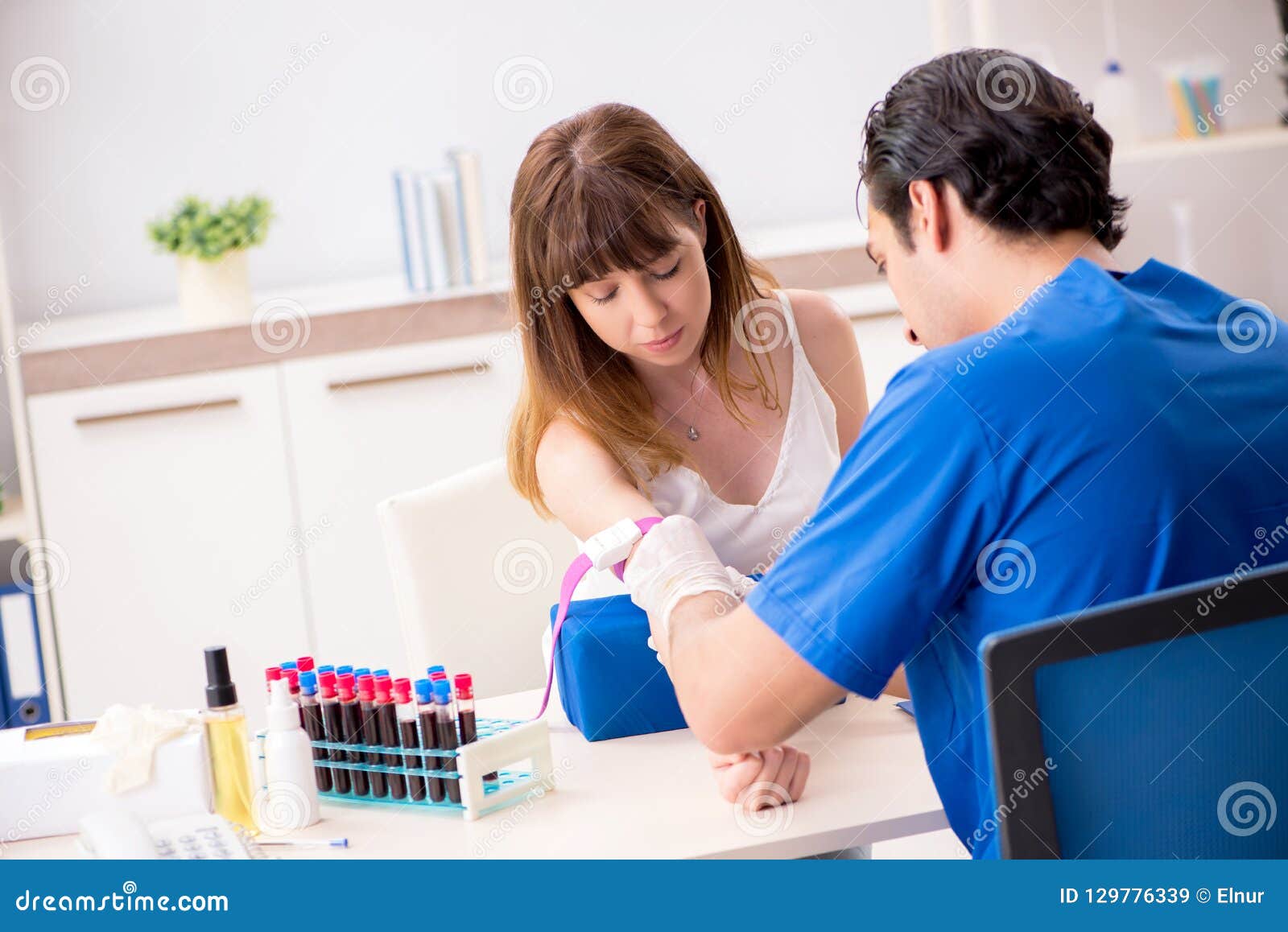 The Young Patient during Blood Test Sampling Procedure Stock Image ...
