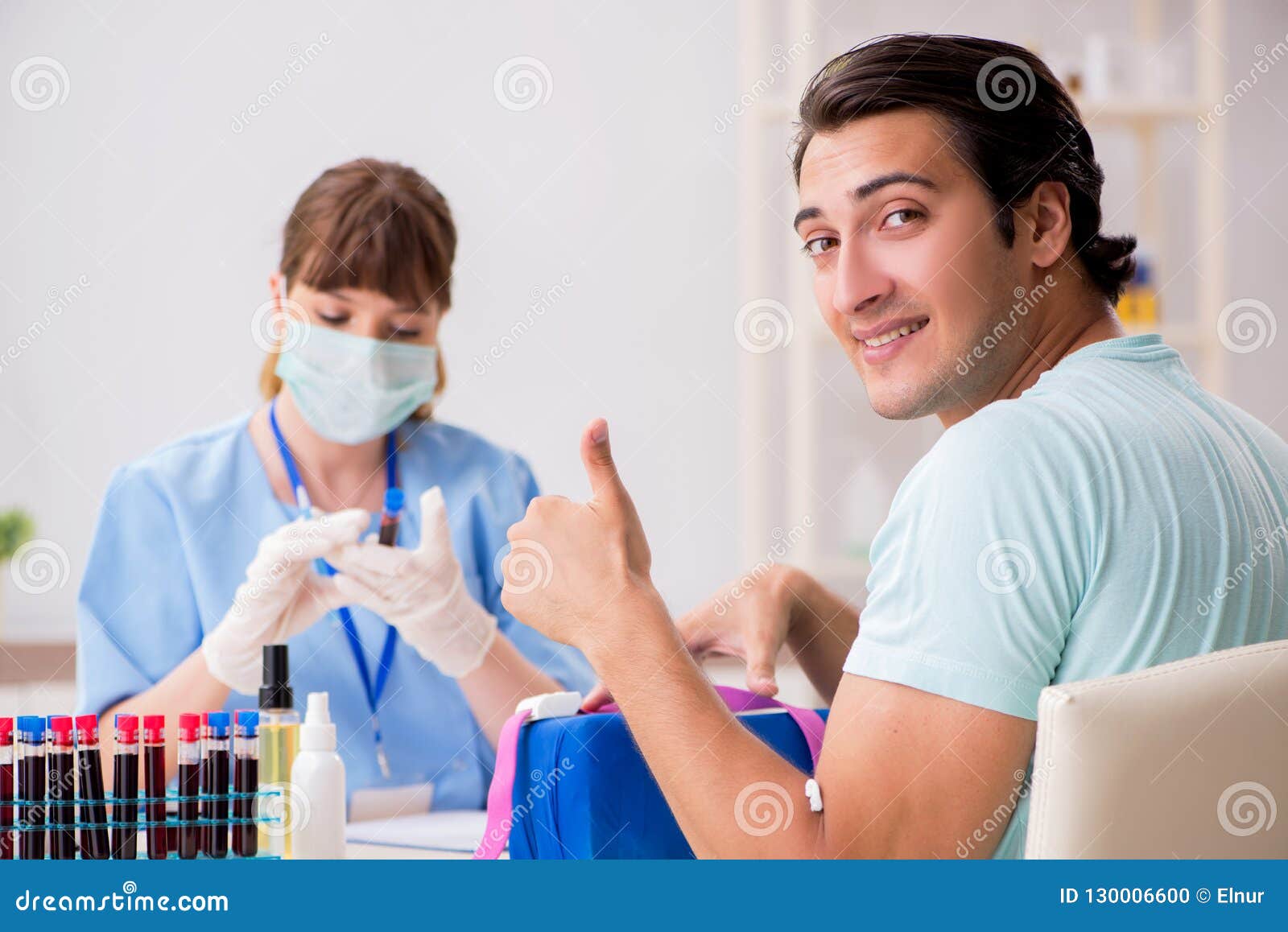 The Young Patient during Blood Test Sampling Procedure Stock Photo ...