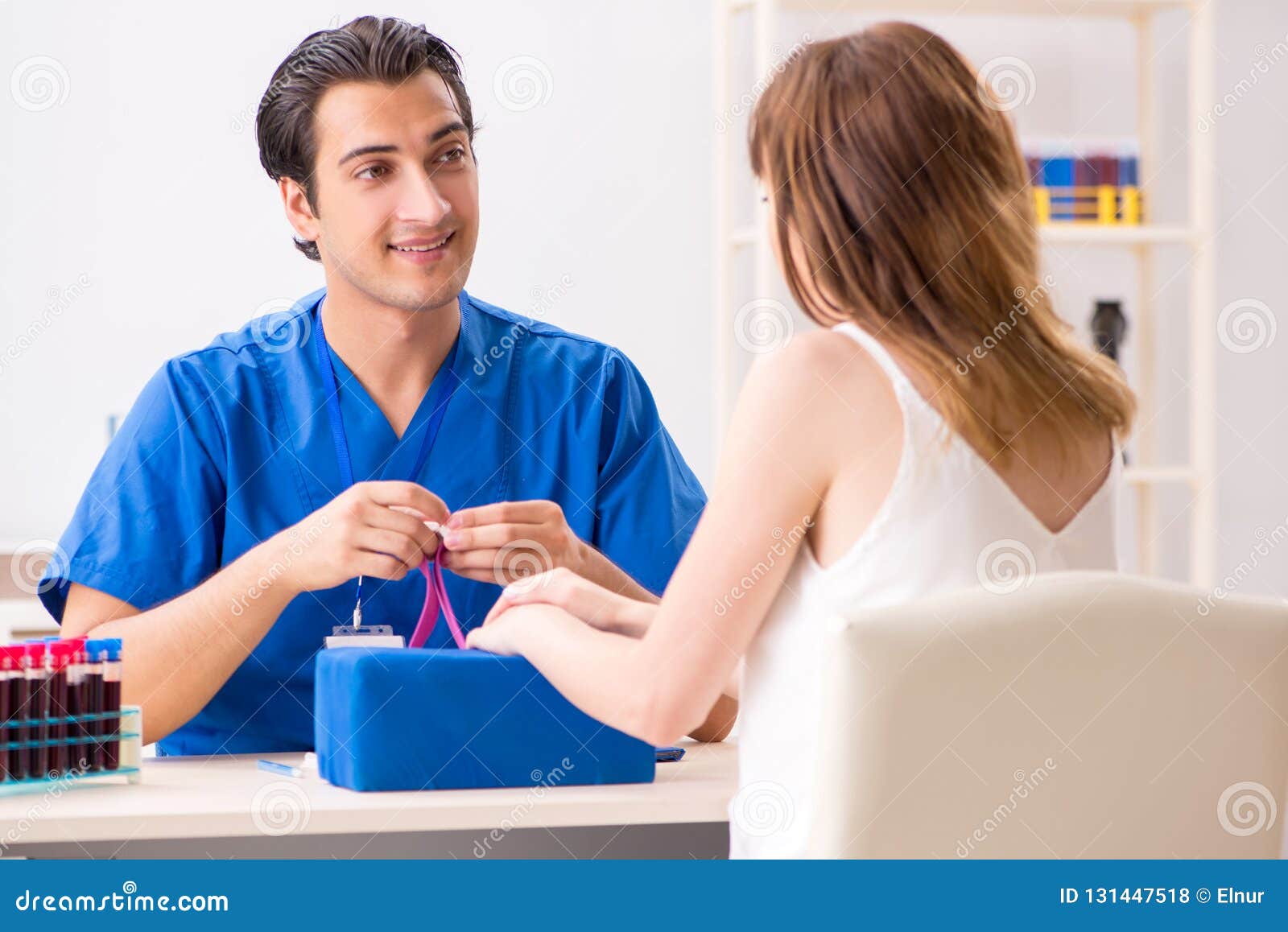 The Young Patient during Blood Test Sampling Procedure Stock Photo ...