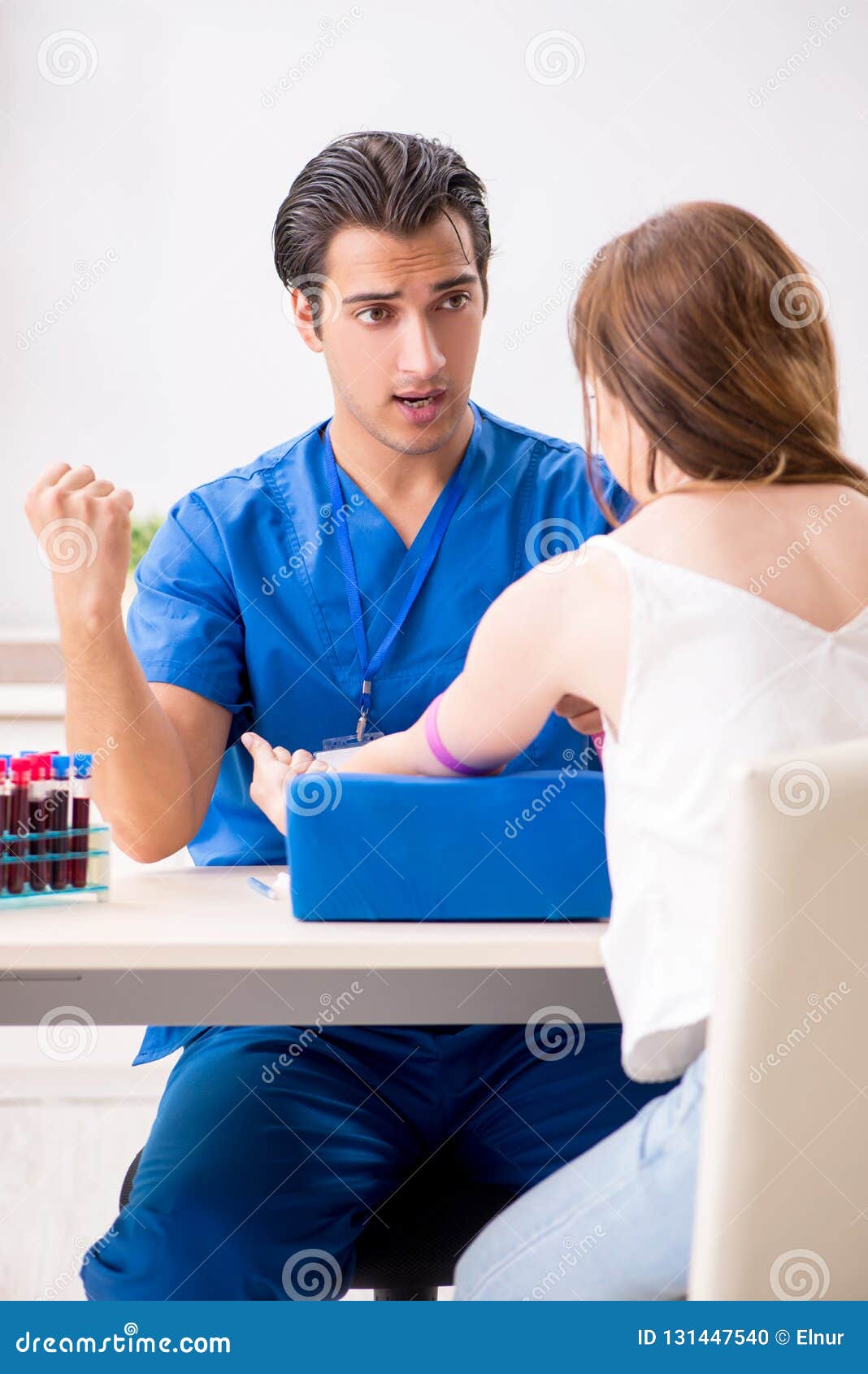 The Young Patient during Blood Test Sampling Procedure Stock Photo ...