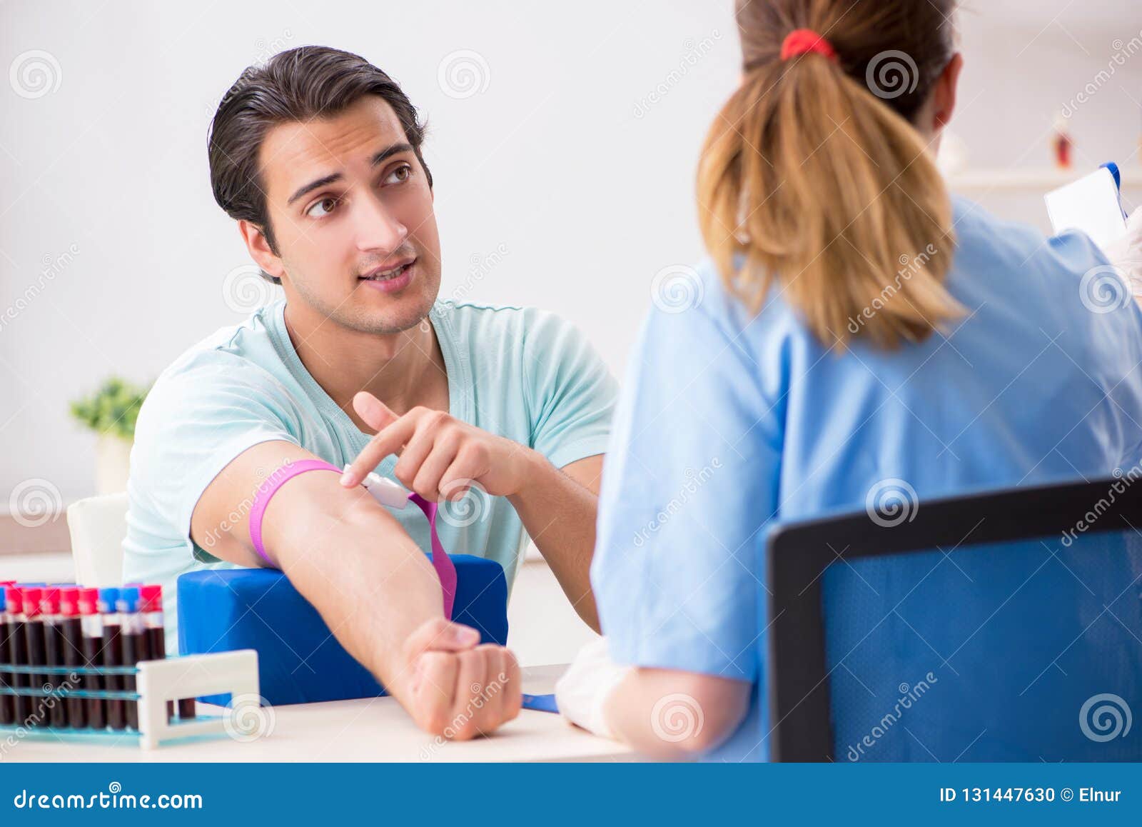 The Young Patient during Blood Test Sampling Procedure Stock Photo ...