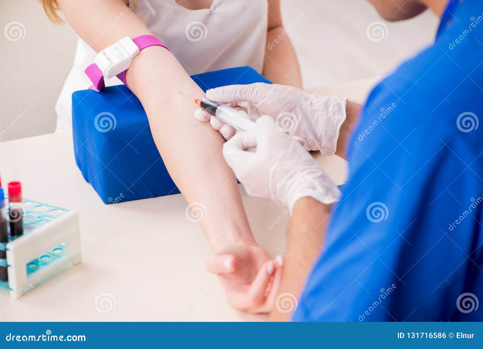 The Young Patient during Blood Test Sampling Procedure Stock Photo ...