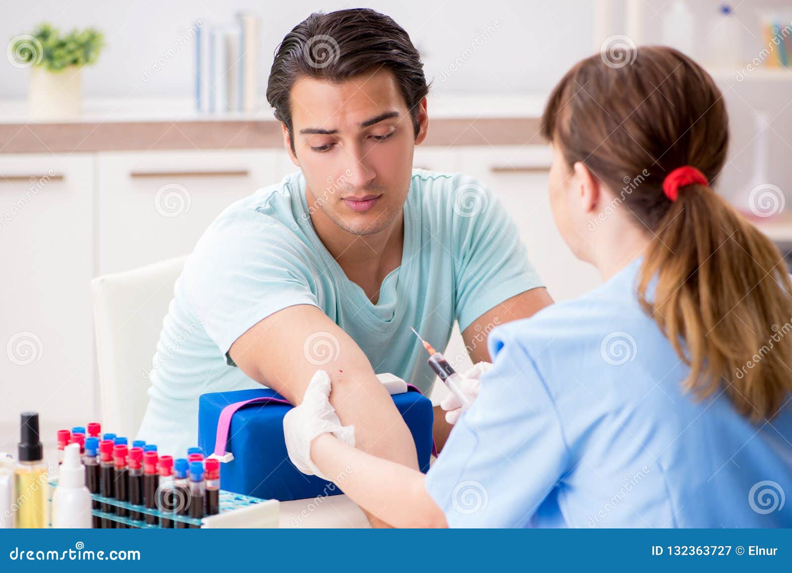 The Young Patient during Blood Test Sampling Procedure Stock Image ...
