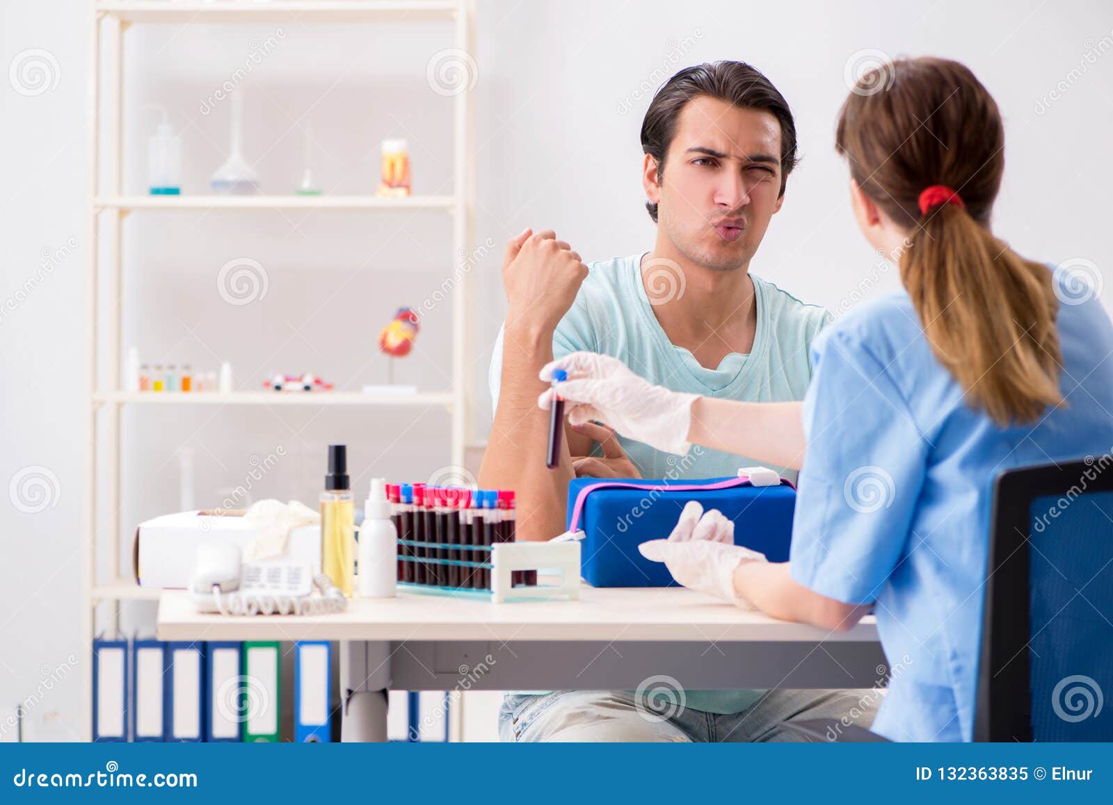 The Young Patient during Blood Test Sampling Procedure Stock Image ...