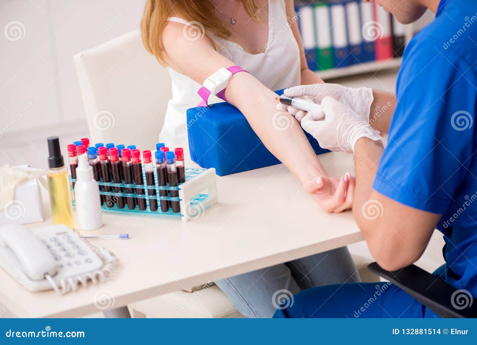 The Young Patient during Blood Test Sampling Procedure Stock Photo ...