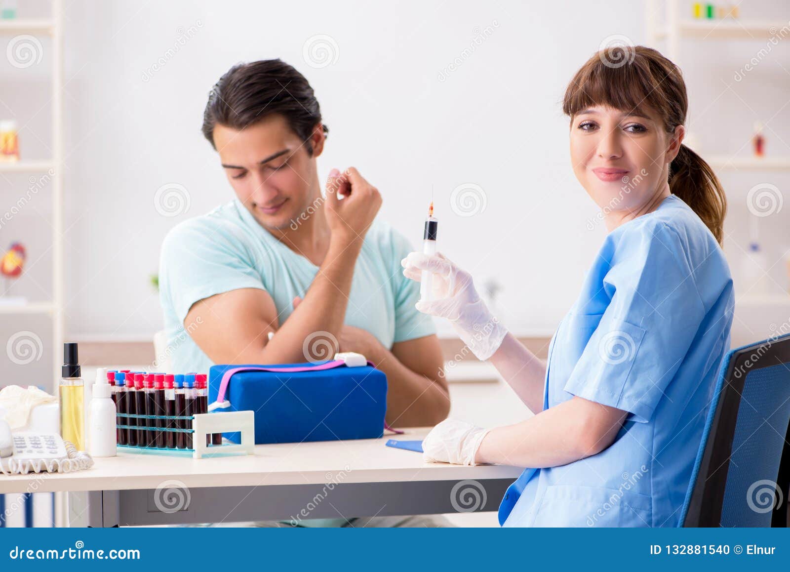 The Young Patient during Blood Test Sampling Procedure Stock Photo ...