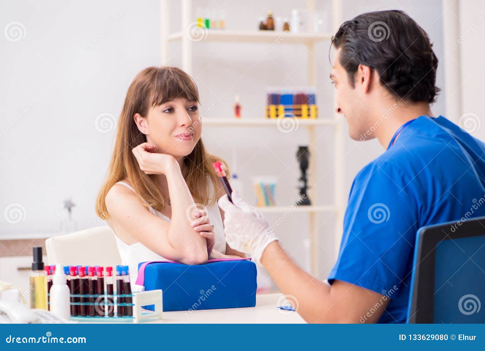 The Young Patient during Blood Test Sampling Procedure Stock Photo ...