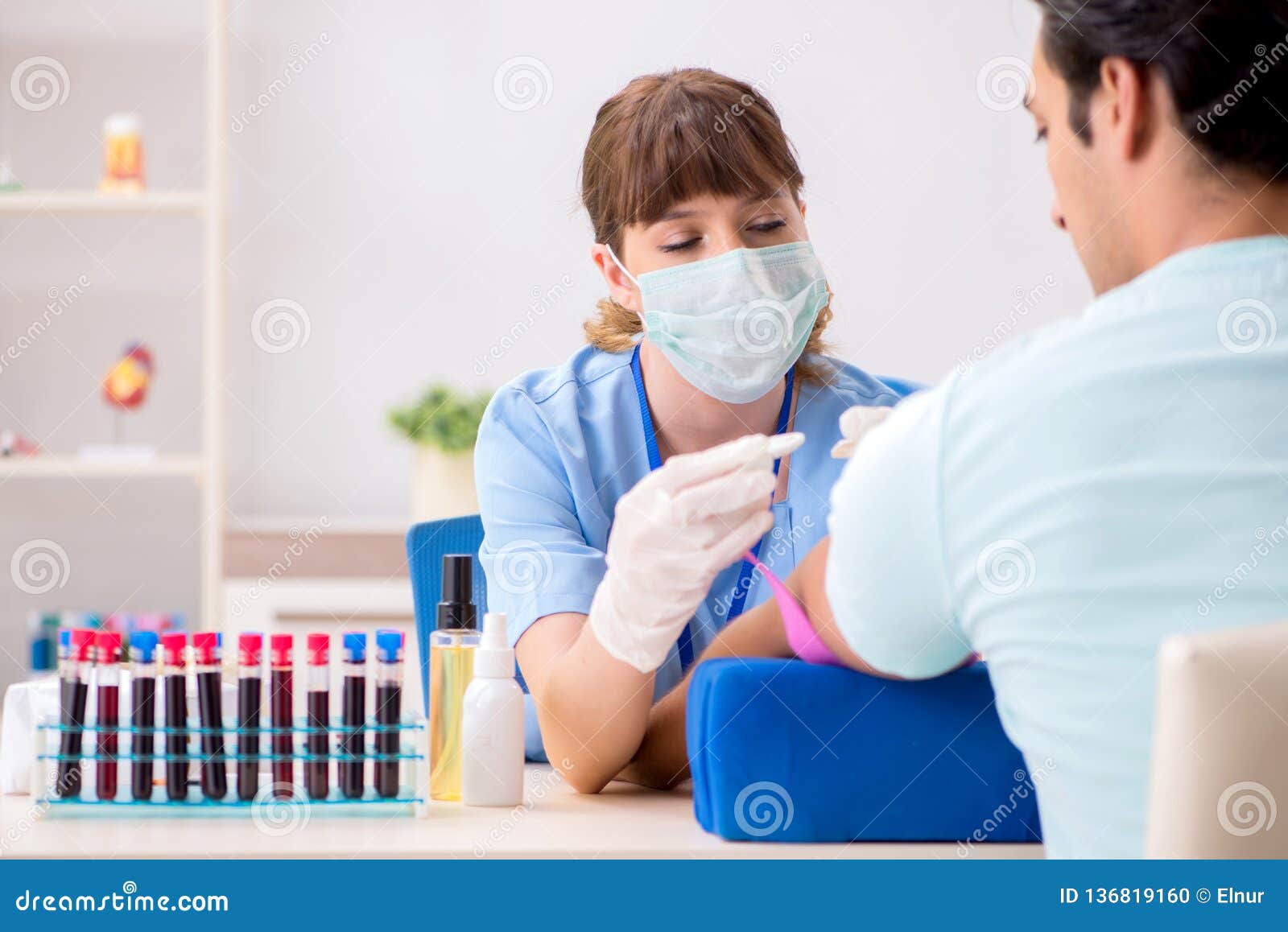 The Young Patient during Blood Test Sampling Procedure Stock Photo ...