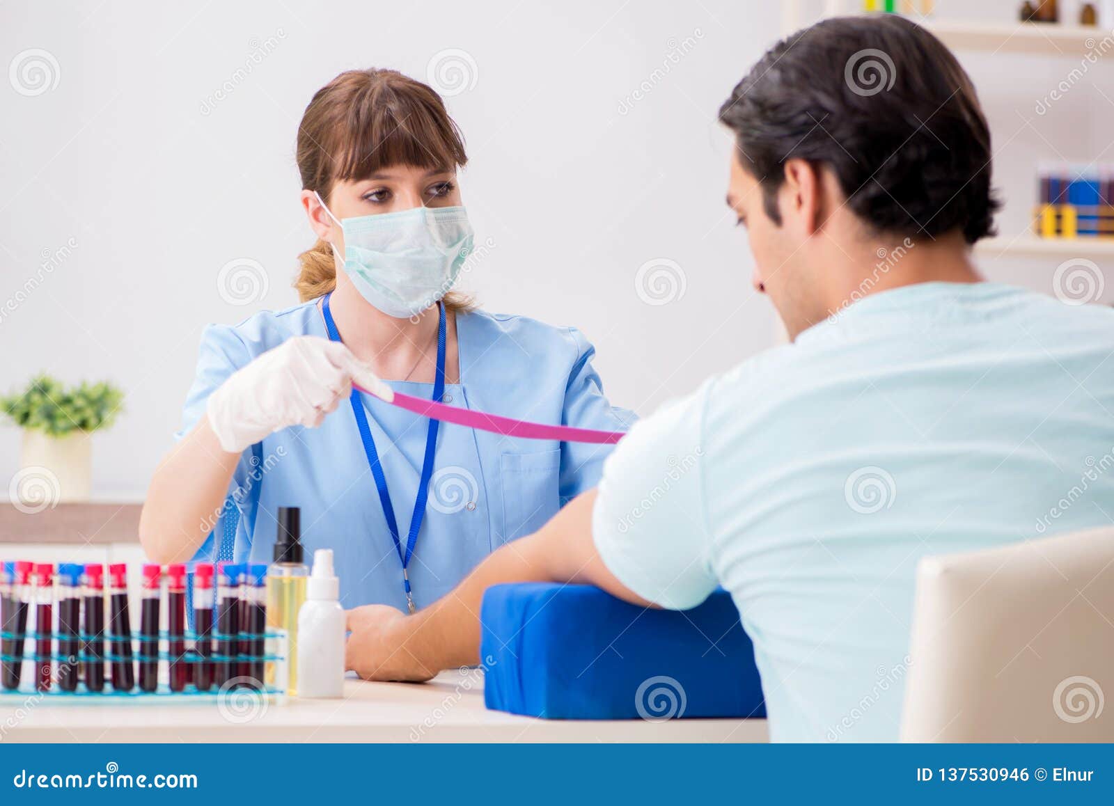 The Young Patient during Blood Test Sampling Procedure Stock Photo ...