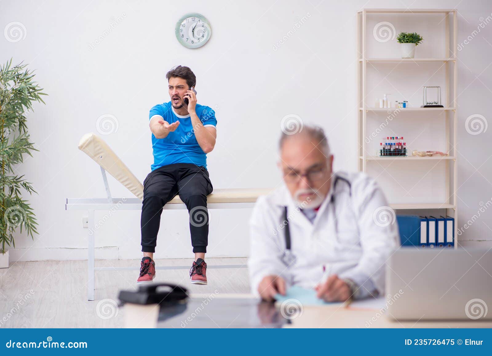 Young Male Patient Visiting Old Male Doctor Stock Image - Image of ...