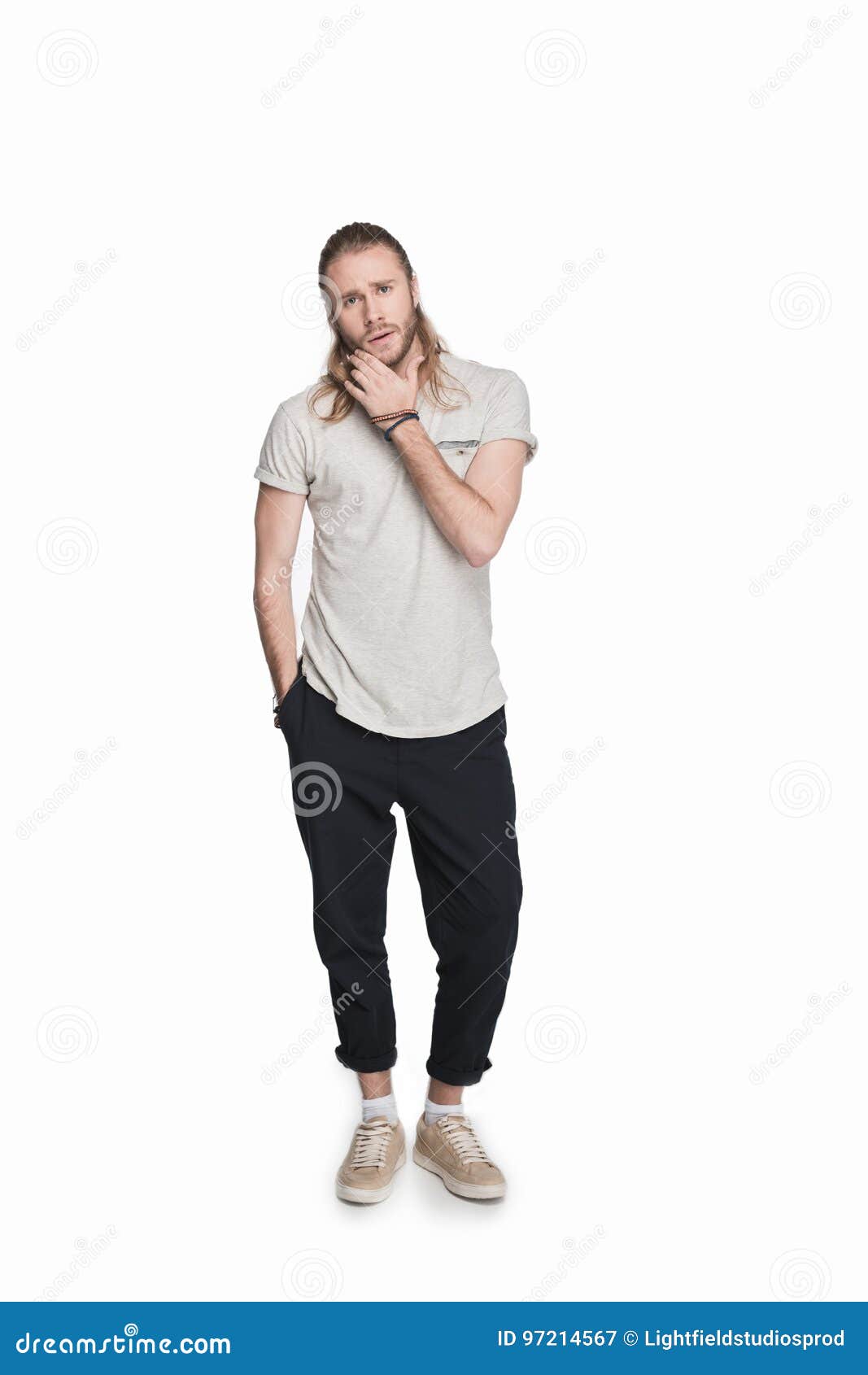 Young Pensive Man Standing and Looking at Camera Stock Image - Image of ...